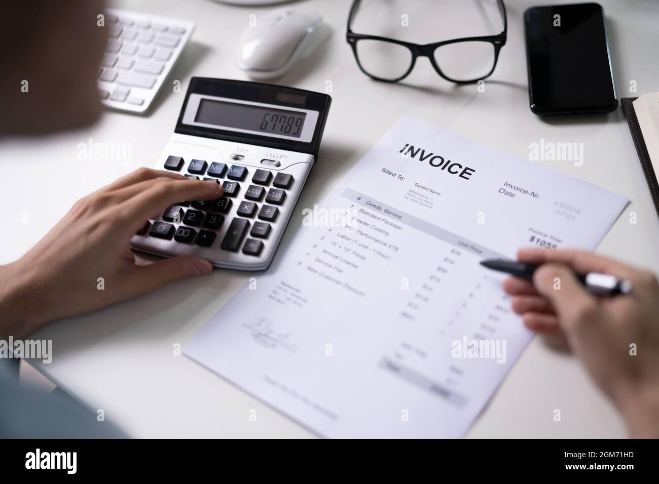 Public Account Tax Ledger And Budget Using Calculator Stock Photo - Alamy