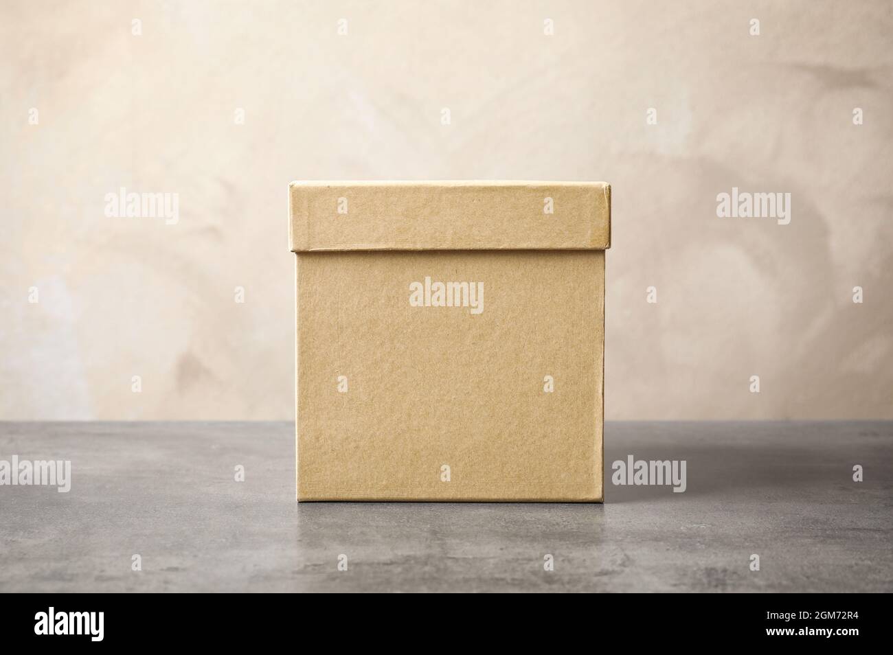 Cardboard box on table. Mockup for design Stock Photo - Alamy