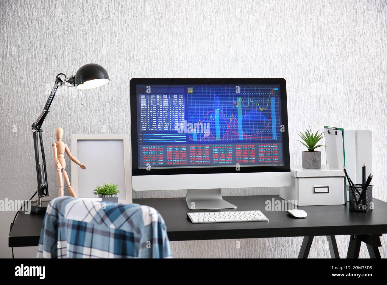 Modern comfortable workplace with computer on desk at home Stock Photo ...
