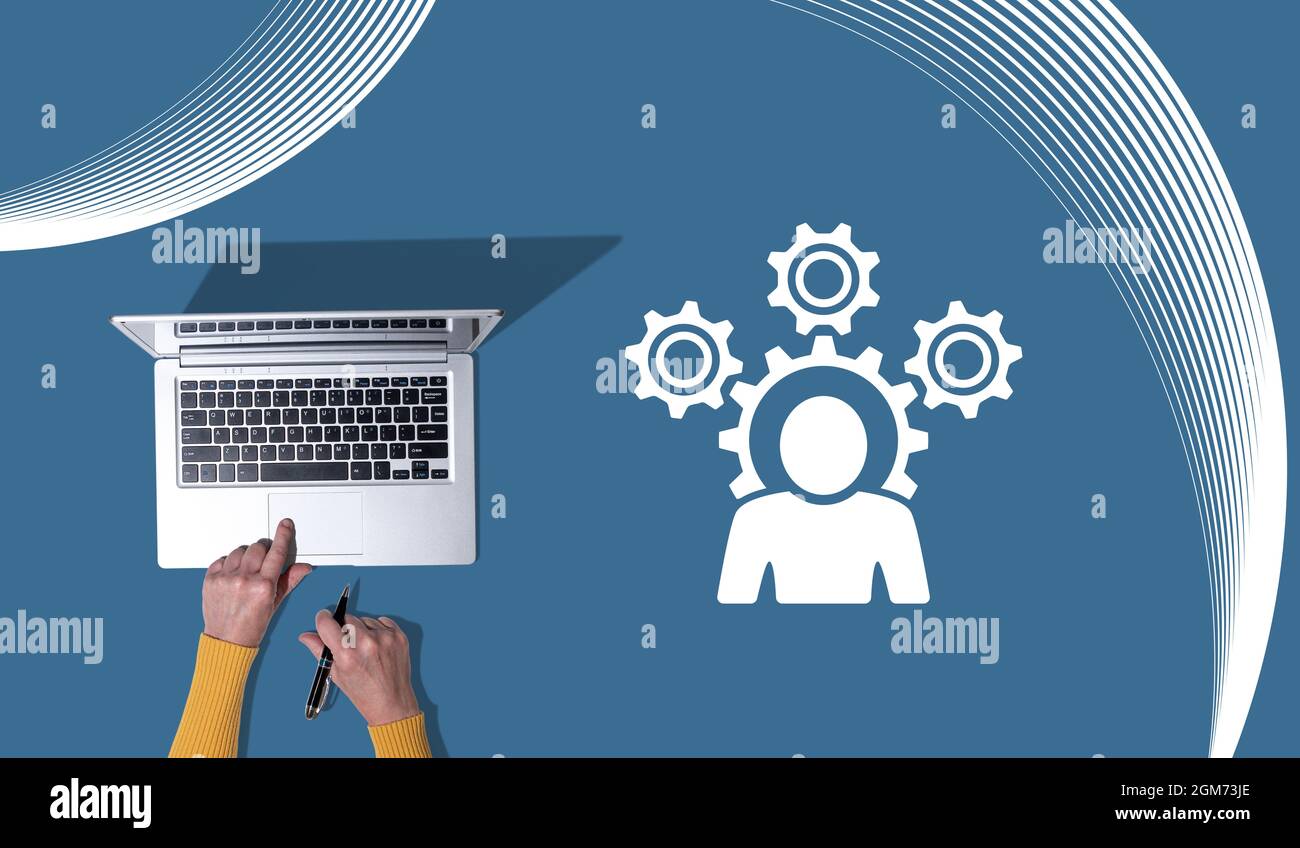 Top view of hands using laptop with symbol of competence concept Stock ...