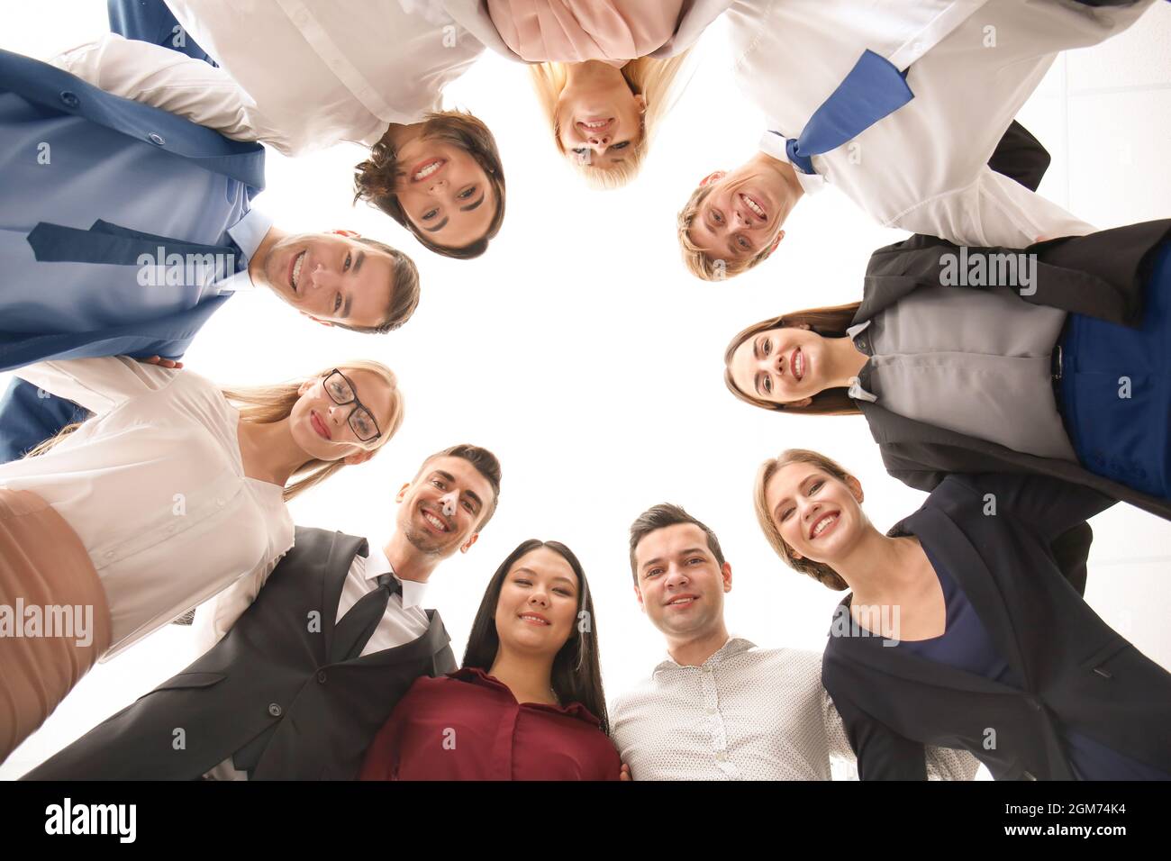 People standing together, view from below. Unity concept Stock Photo ...