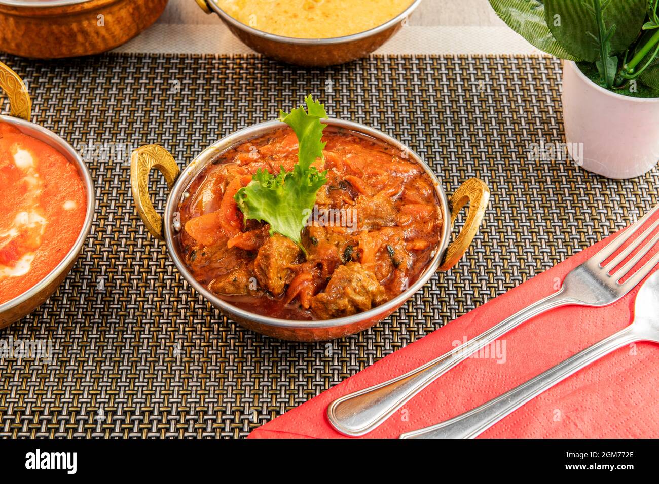 Hindu recipe for stewed bhuna beef presented in a traditional Pakistani ...
