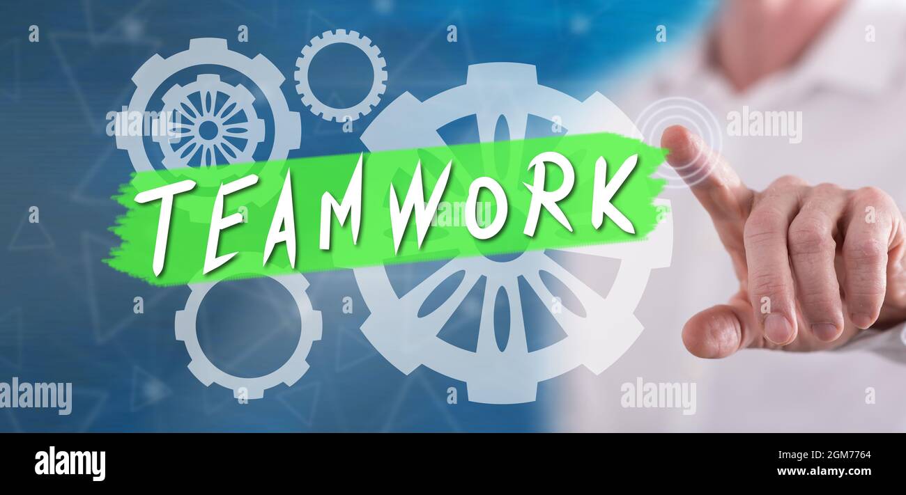 Man touching a teamwork concept on a touch screen with his finger Stock ...