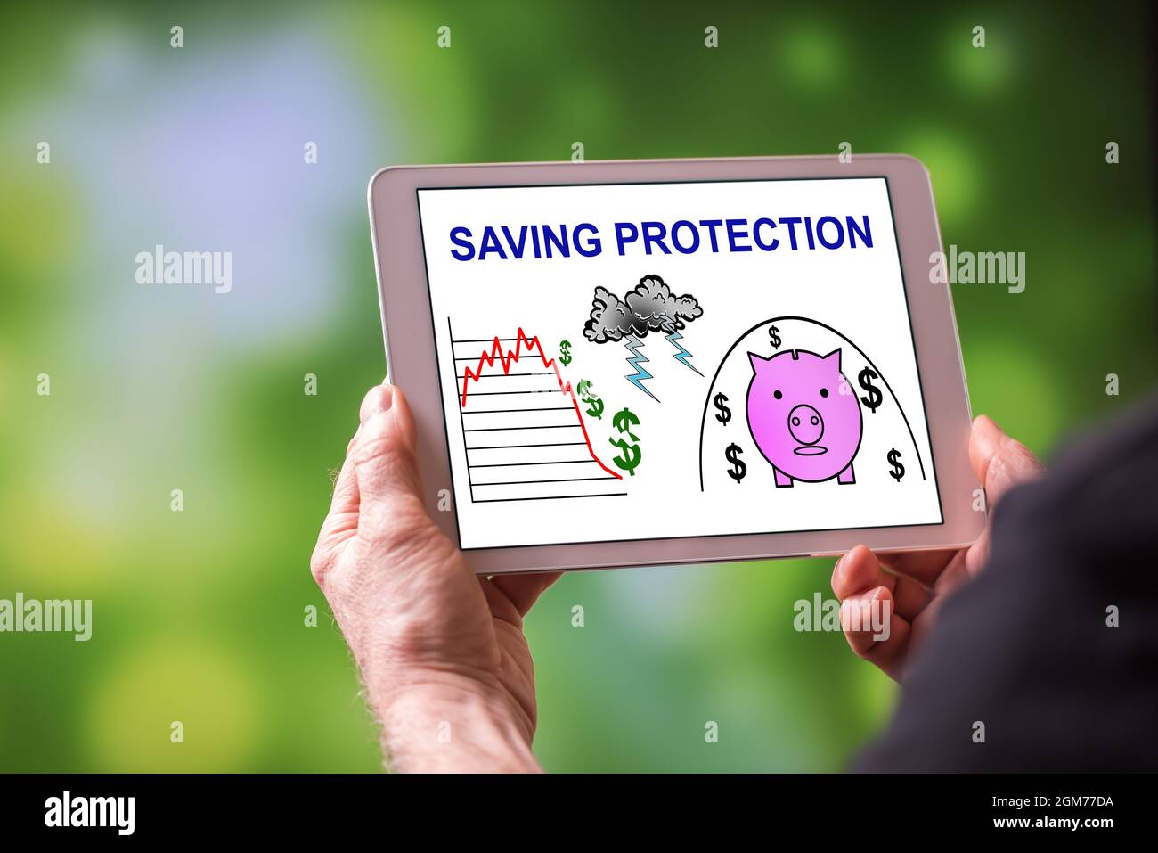 Man holding a tablet showing saving protection concept Stock Photo - Alamy