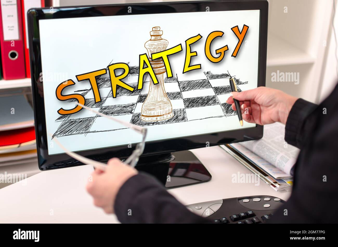 Businesswoman showing strategy concept on a computer screen Stock Photo ...