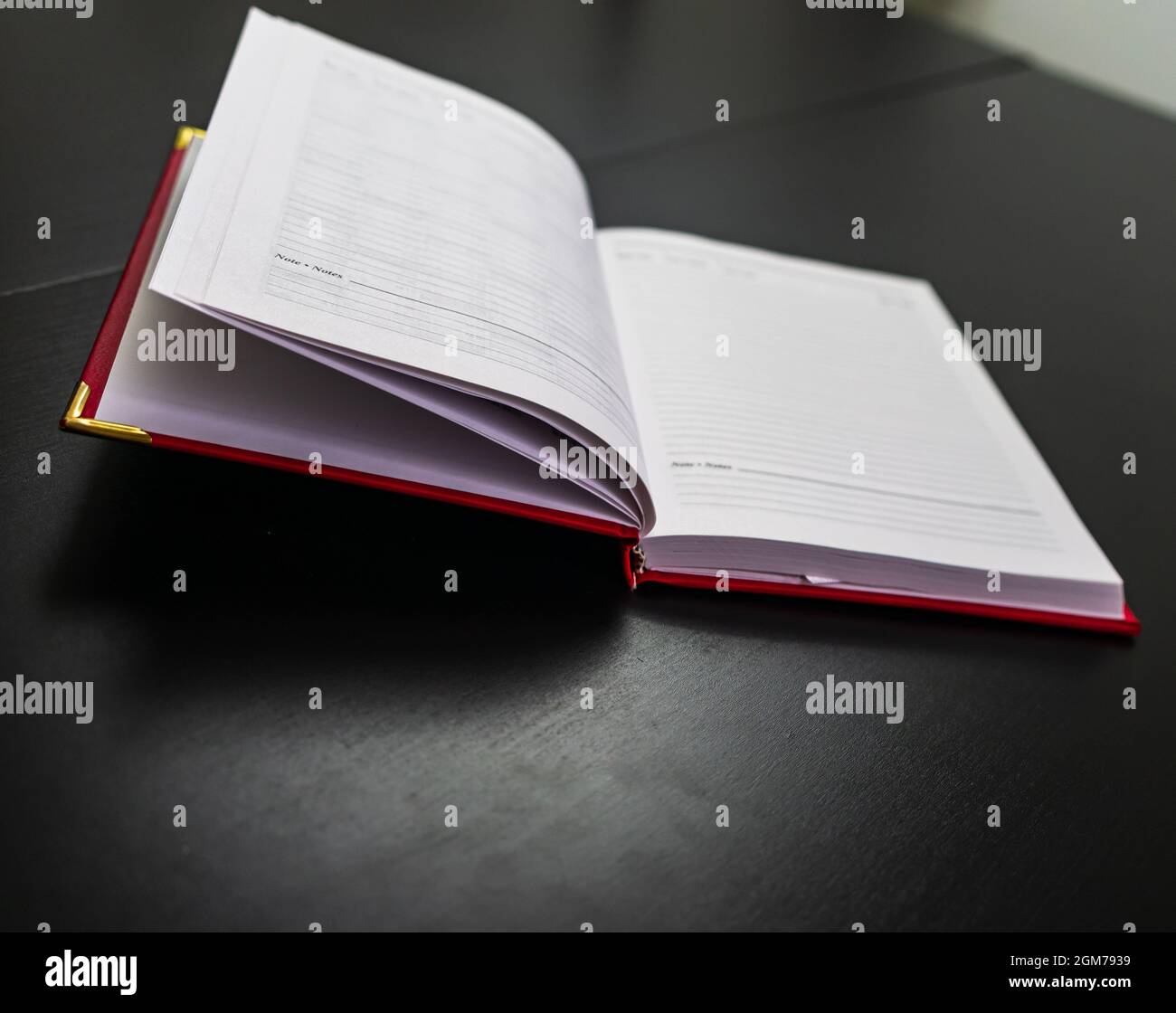 Opened book red cover hi-res stock photography and images - Alamy