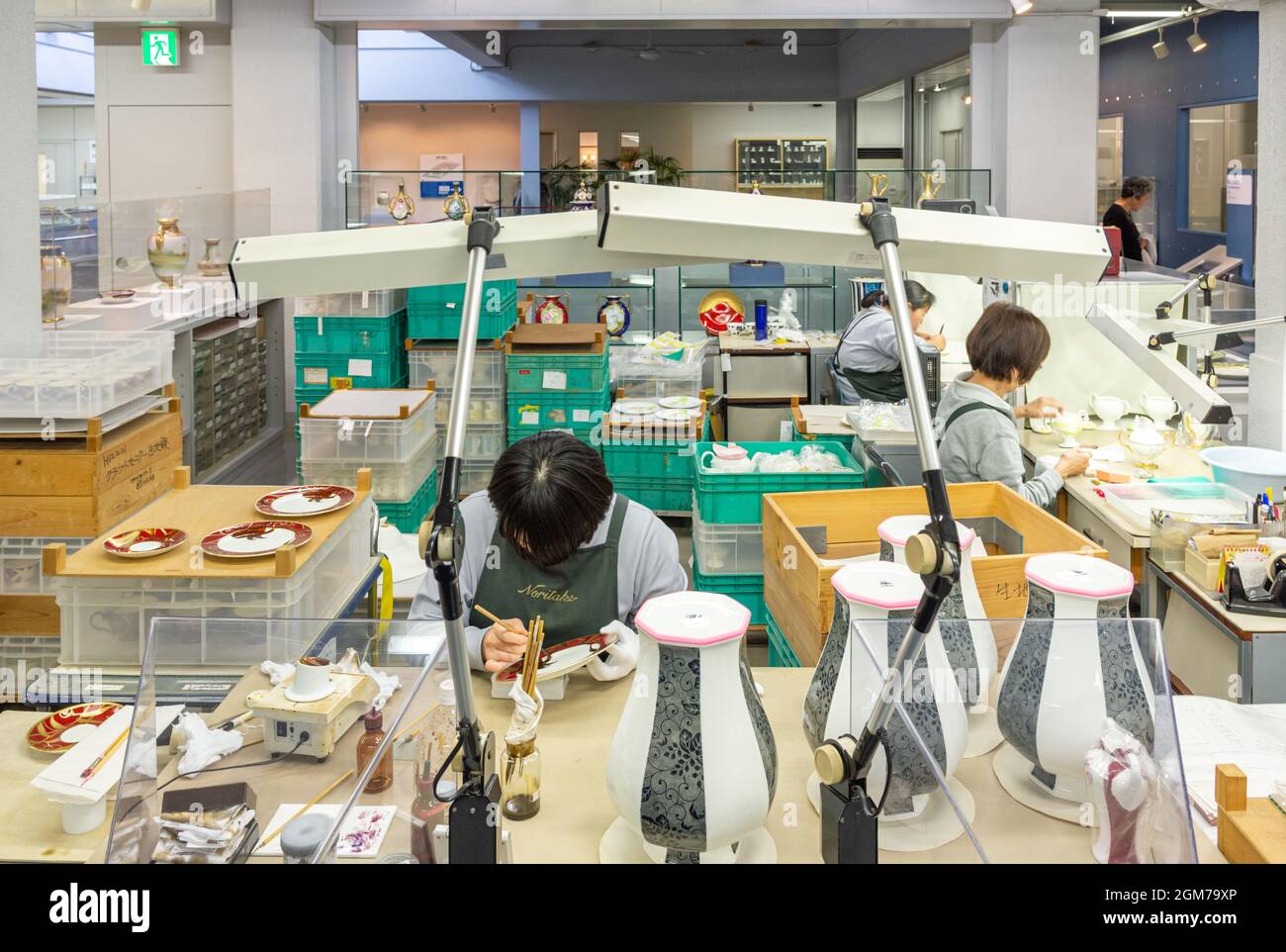 Female artists decorating ceramics at the pottery Craft Center in ...