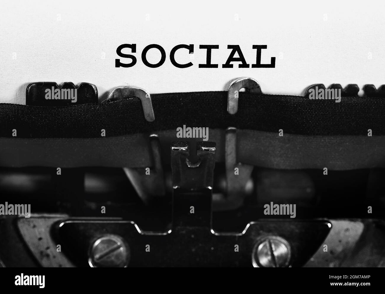 SOCIAL written with the typewriter on white sheet Stock Photo - Alamy