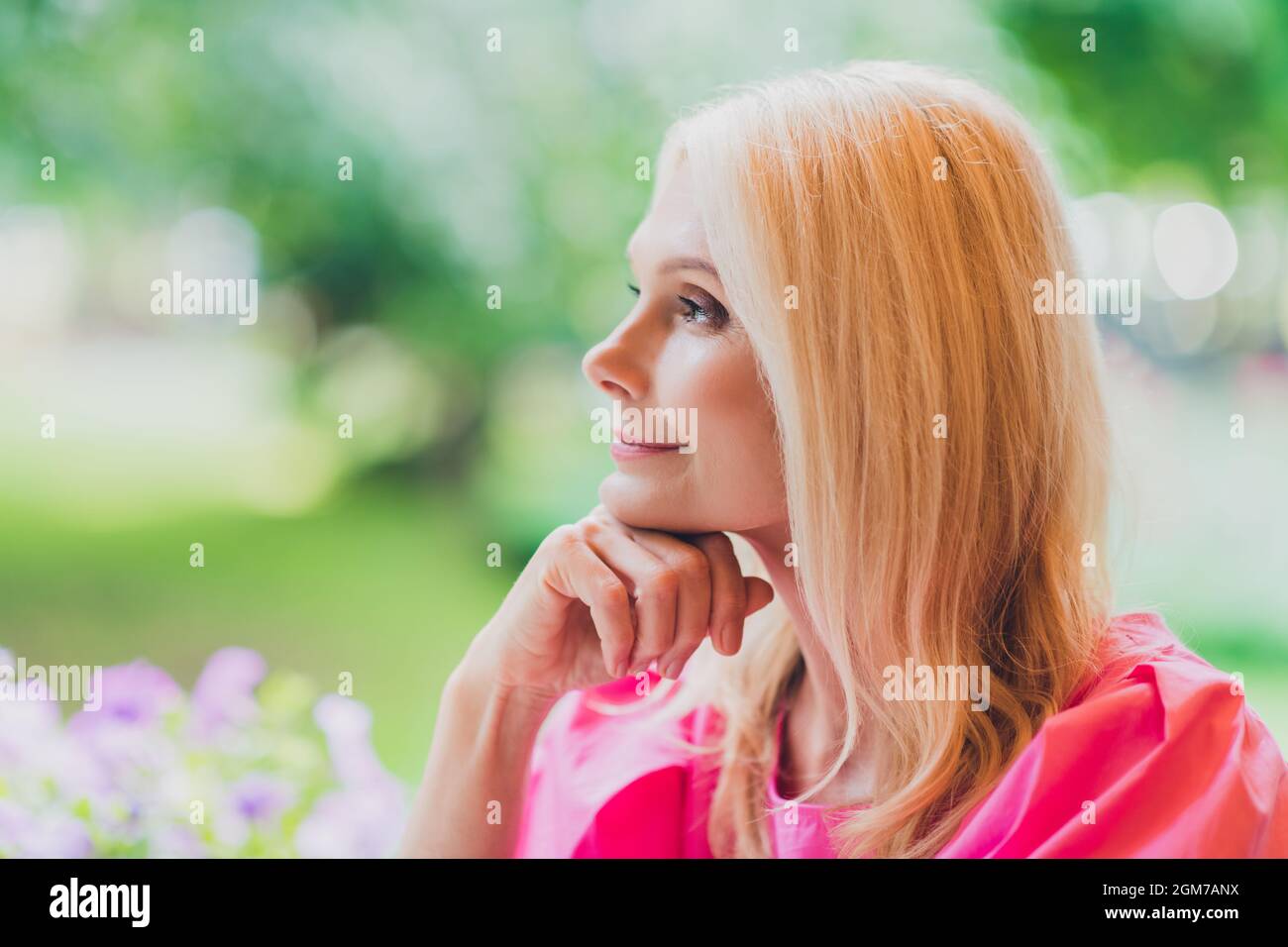 Photo of sweet charming lady pensioner dressed pink clothes sitting ...