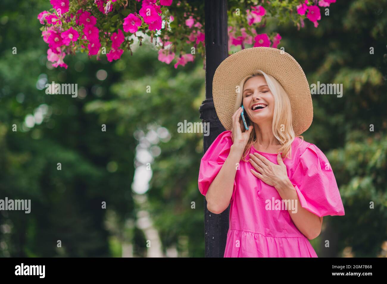 Photo of impressed funny lady pensioner dressed pink clothes headwear ...