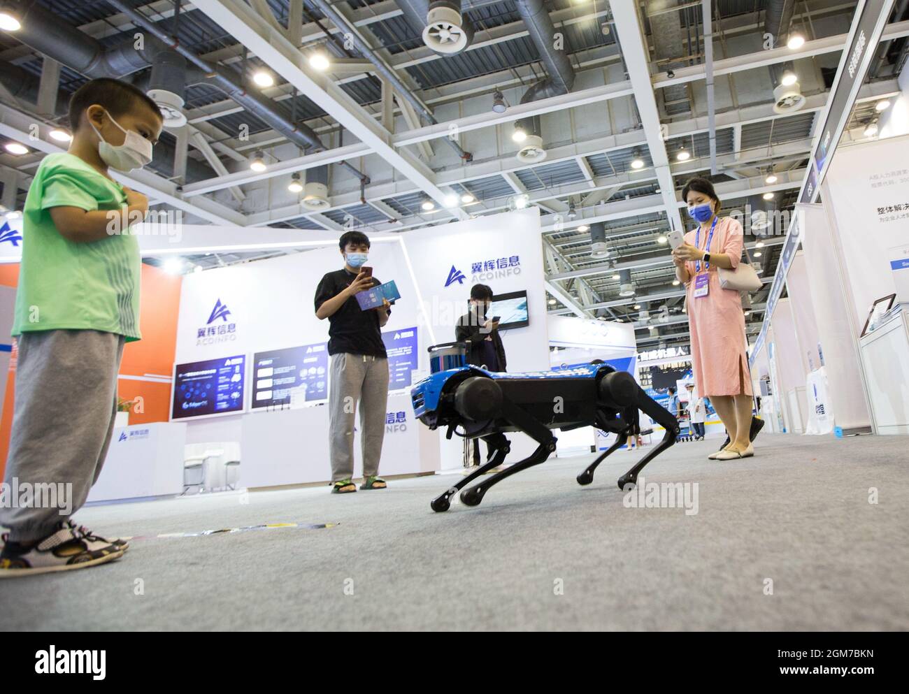 SUZHOU, CHINA - SEPTEMBER 17, 2021 - Visitors watch an intelligent ...