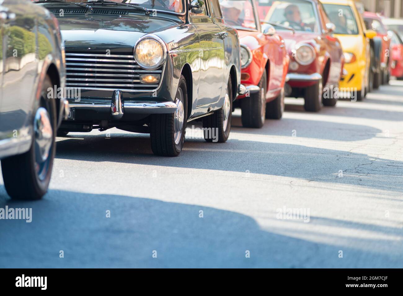 Italy, Lombardy, Meeting of Vintage Cars, Multiple Cars Driving ...