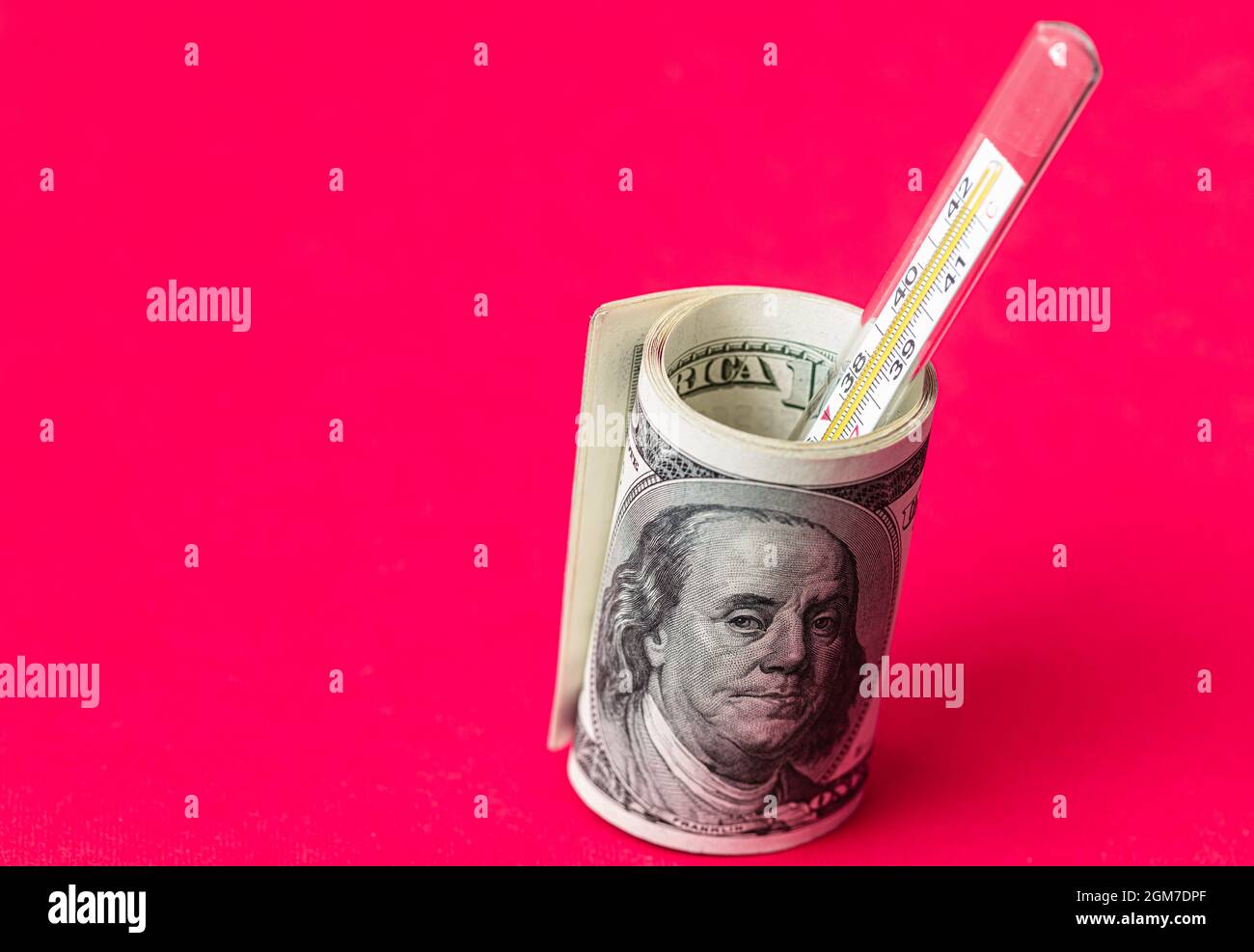 100 dollar bill and thermometer Stock Photo - Alamy