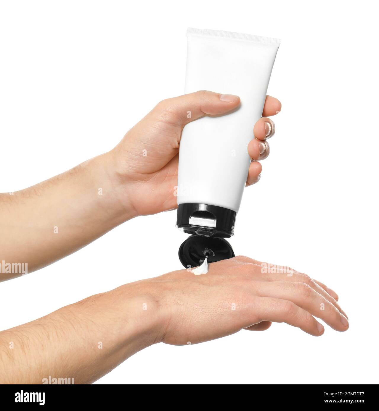Man applying hand cream, on white background Stock Photo - Alamy