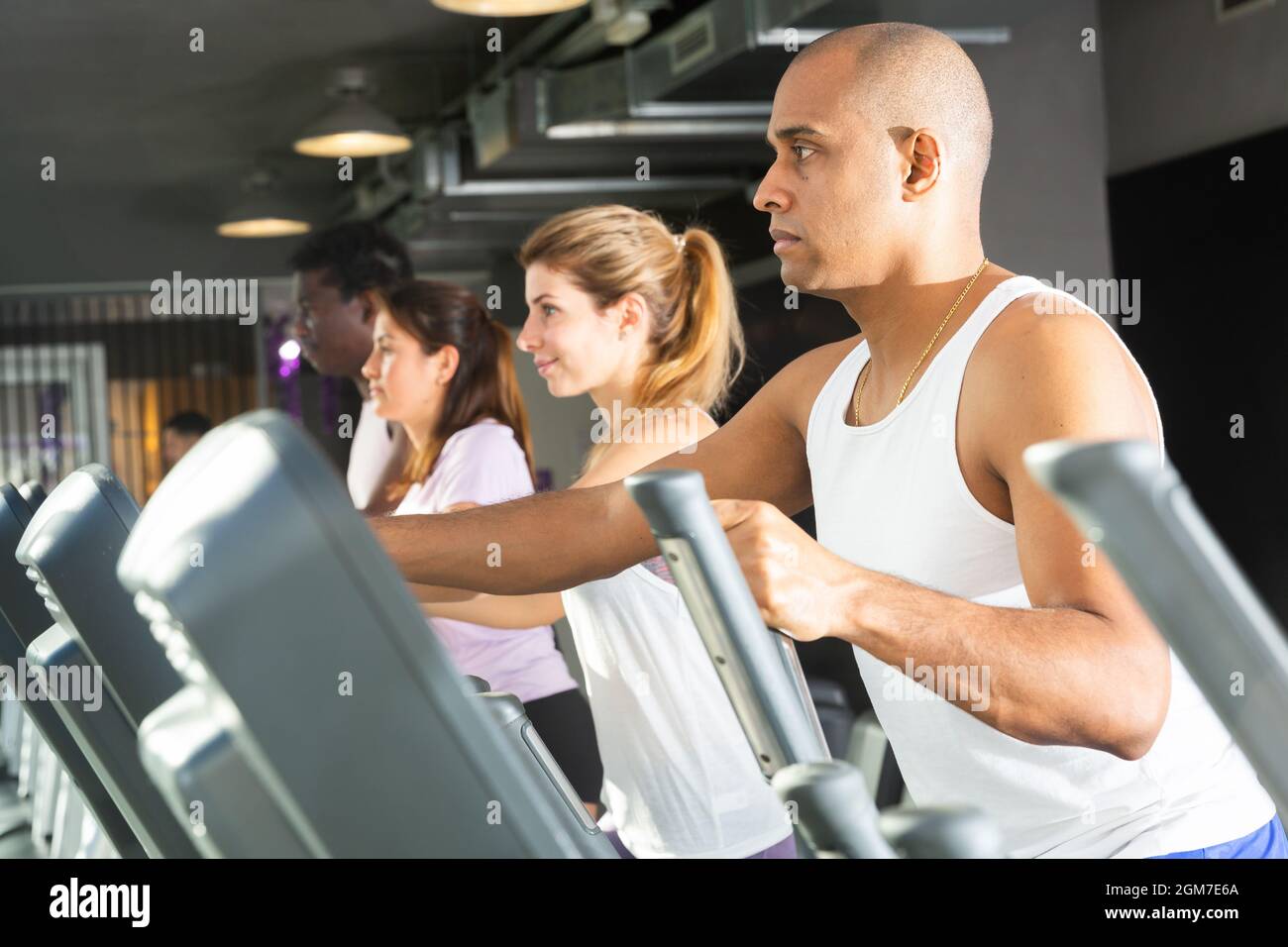 Man on an elliptical bike hi-res stock photography and images - Alamy