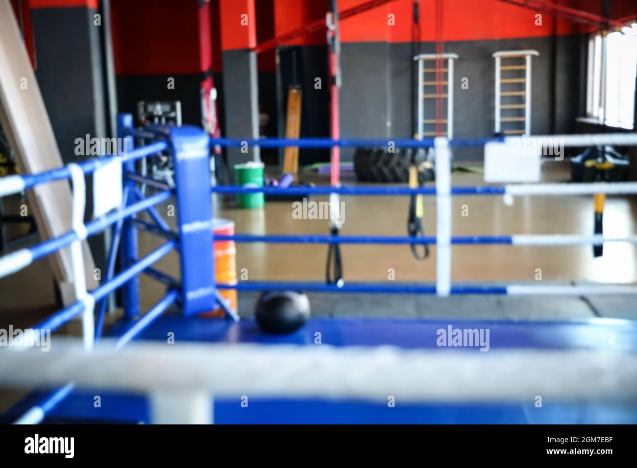 Blurred view of empty boxing ring in gym Stock Photo - Alamy