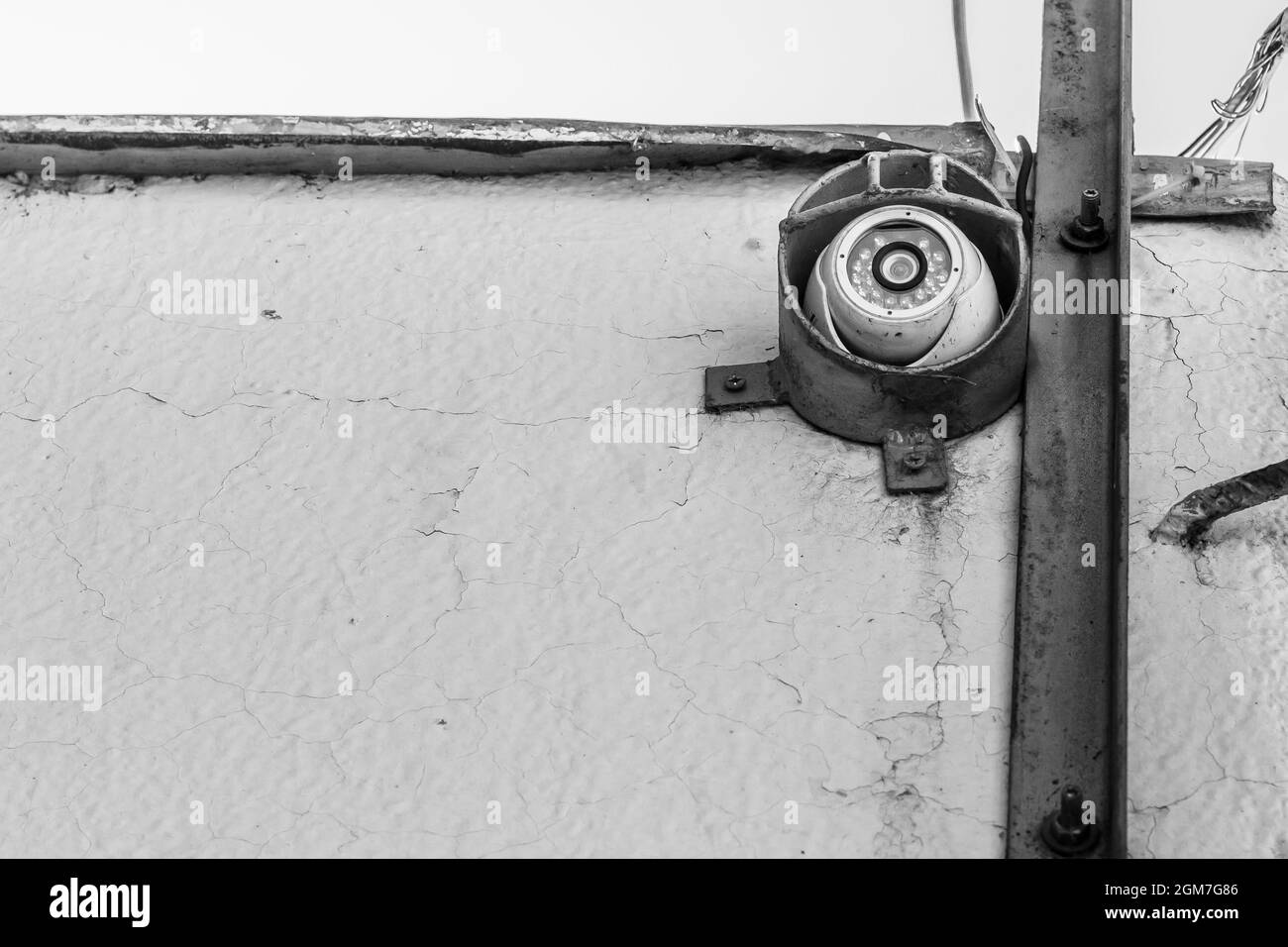 CCTV camera on the wall. Security system Stock Photo - Alamy