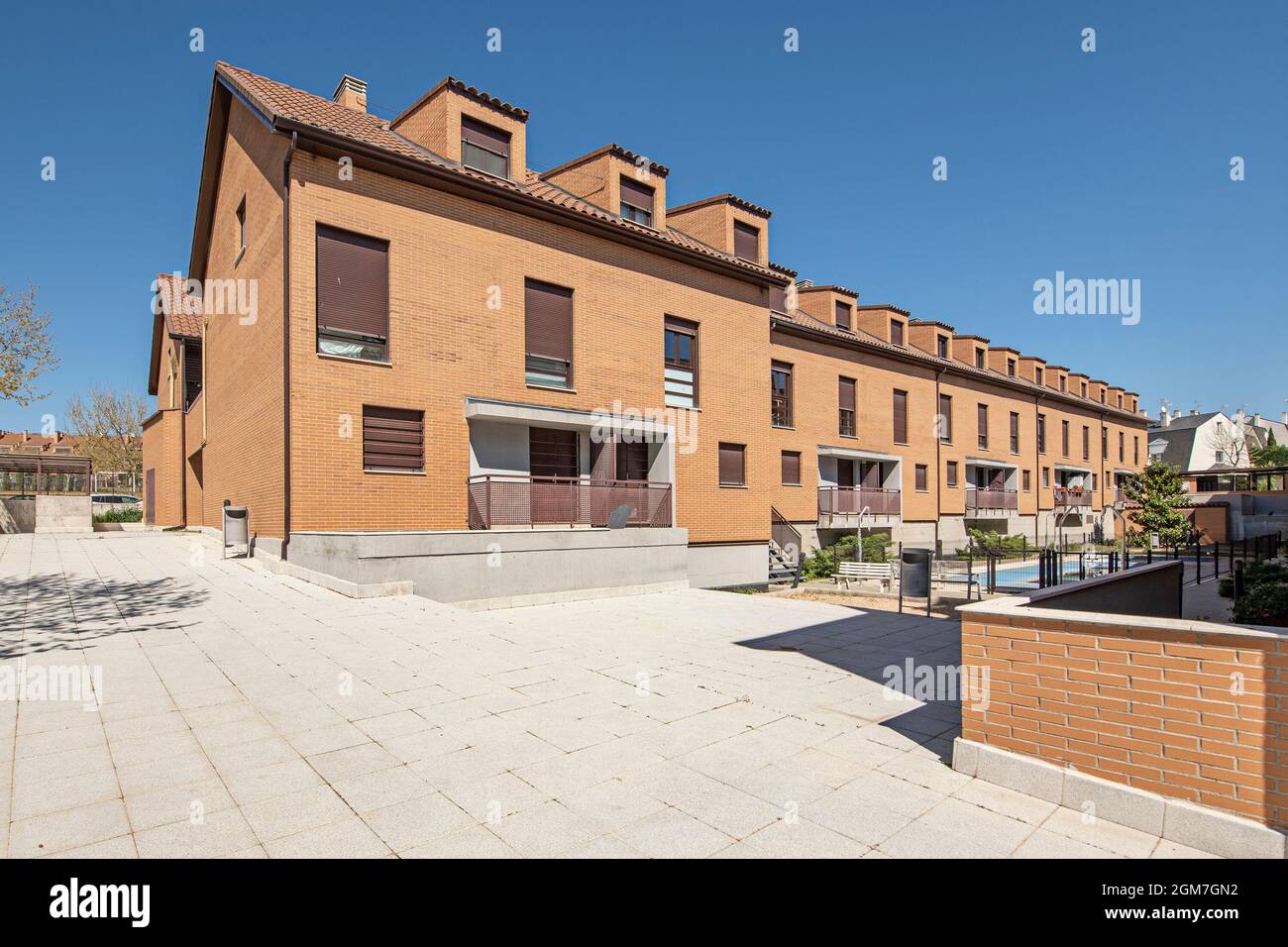 Common areas and swimming pool of a community of neighbors of single ...