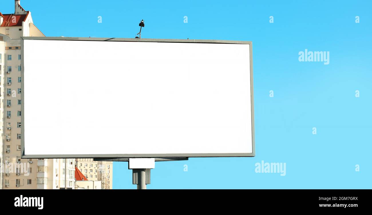 Blank advertising board on city street Stock Photo - Alamy