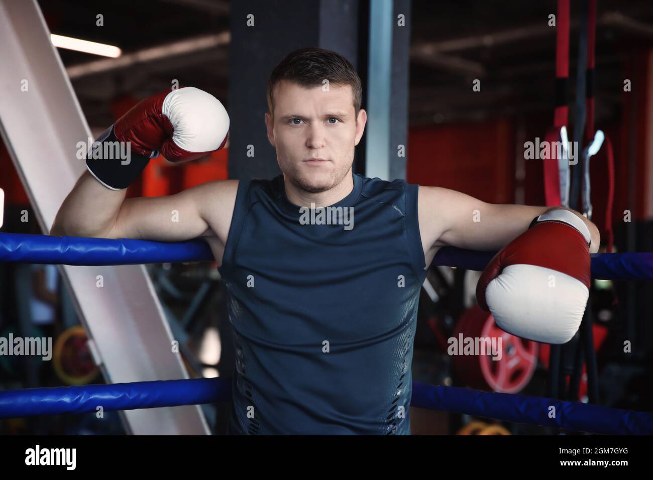 Young man in boxing ring Stock Photo - Alamy