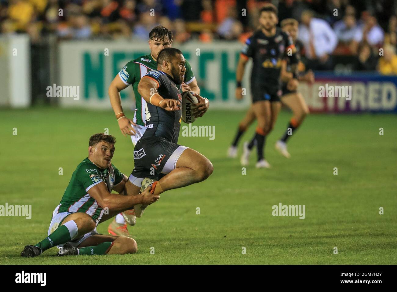 Suaia Matagi (24) of Castleford Tigers is tackled Stock Photo - Alamy