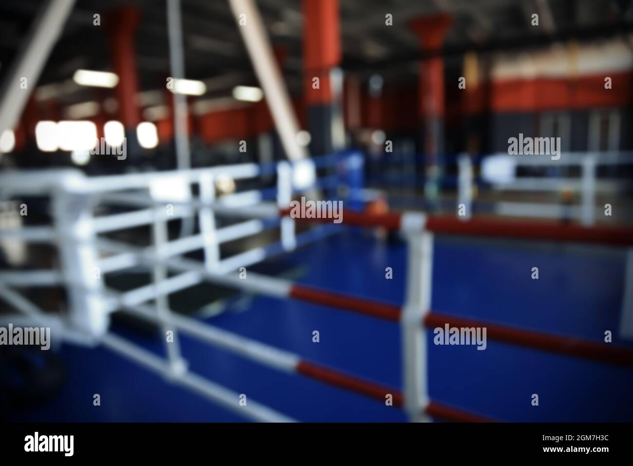Blurred view of empty boxing ring in gym Stock Photo - Alamy
