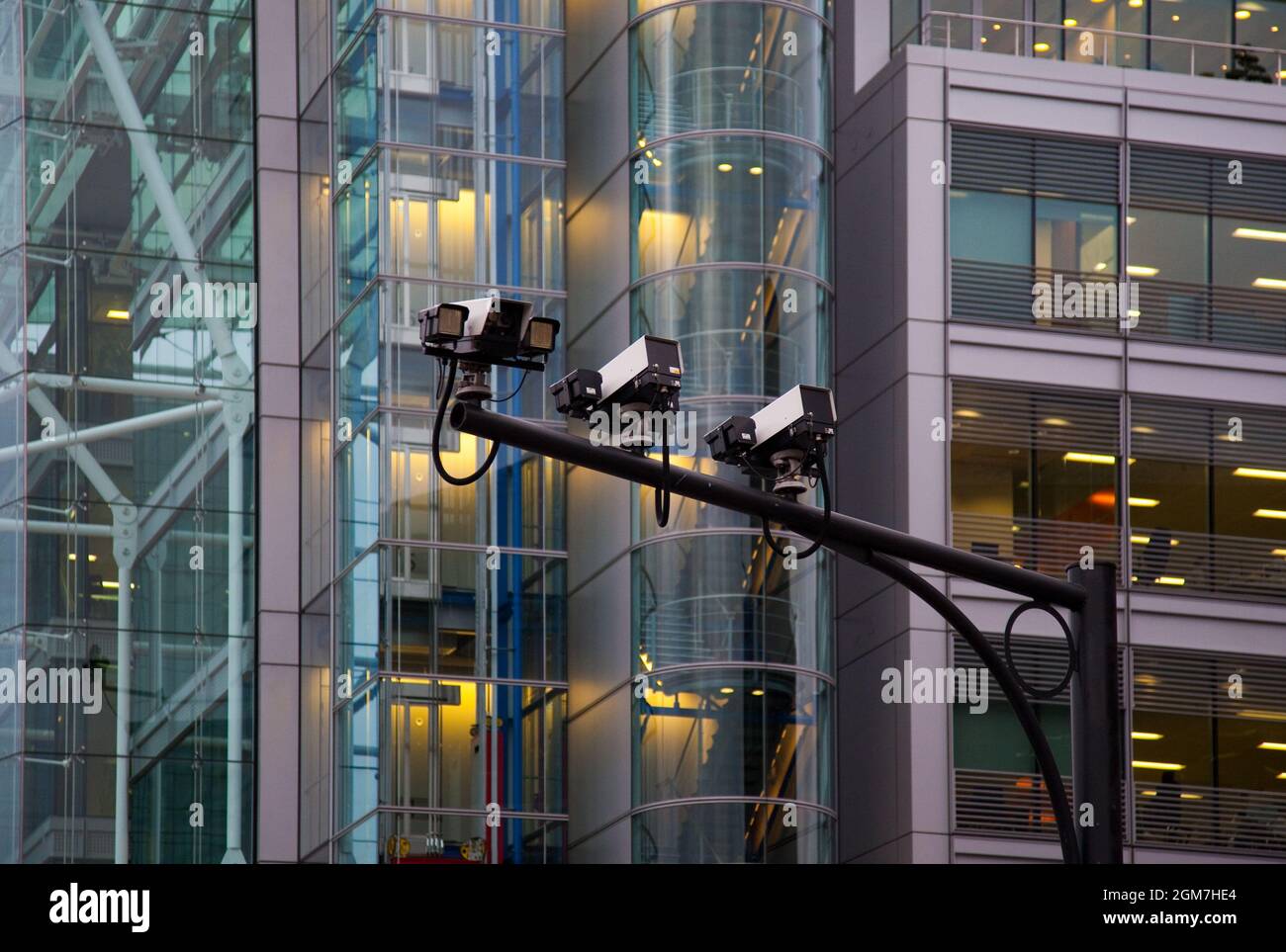 Traffic security cameras in front of city centre office block. 2008 ...