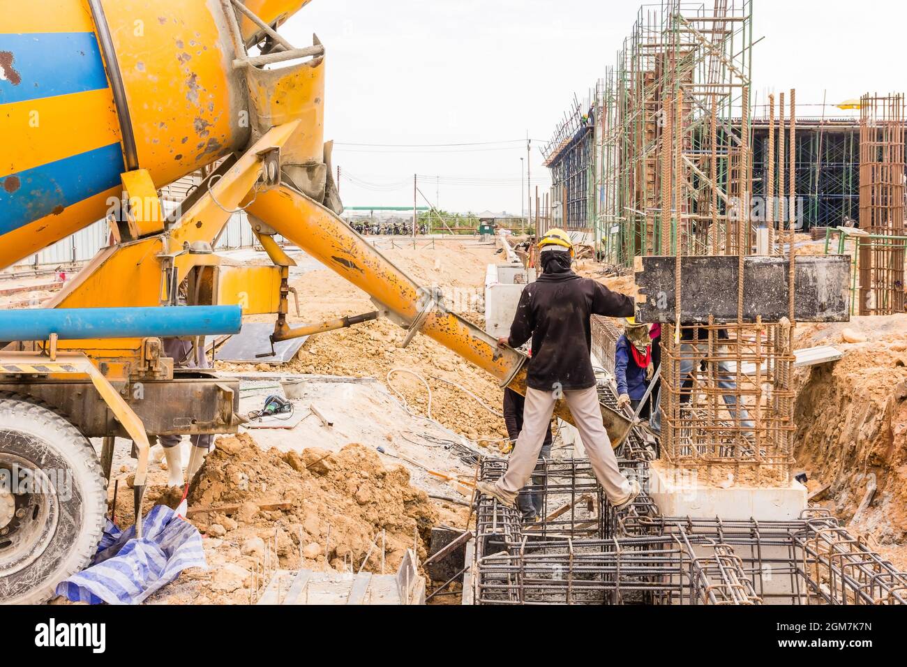 Concrete pouring during commercial concreting floors of buildings in ...