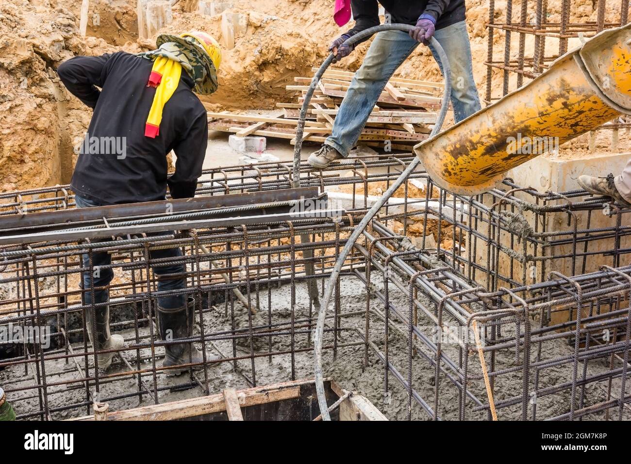 Concrete pouring during commercial concreting floors of buildings in ...