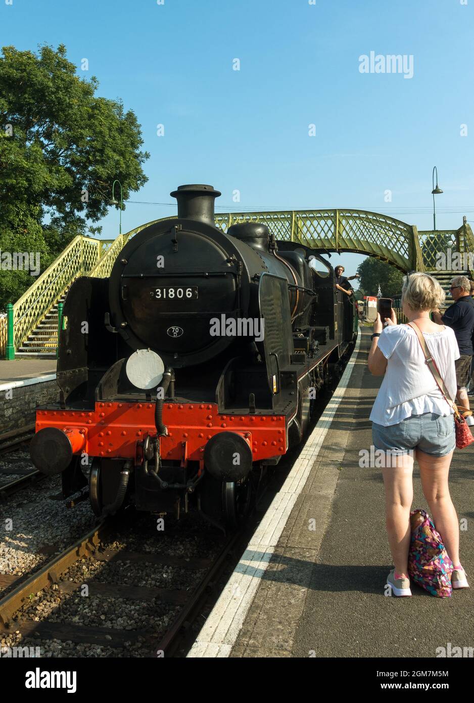 Steam engine 31806, being photographed/video on arrival at Corfe ...
