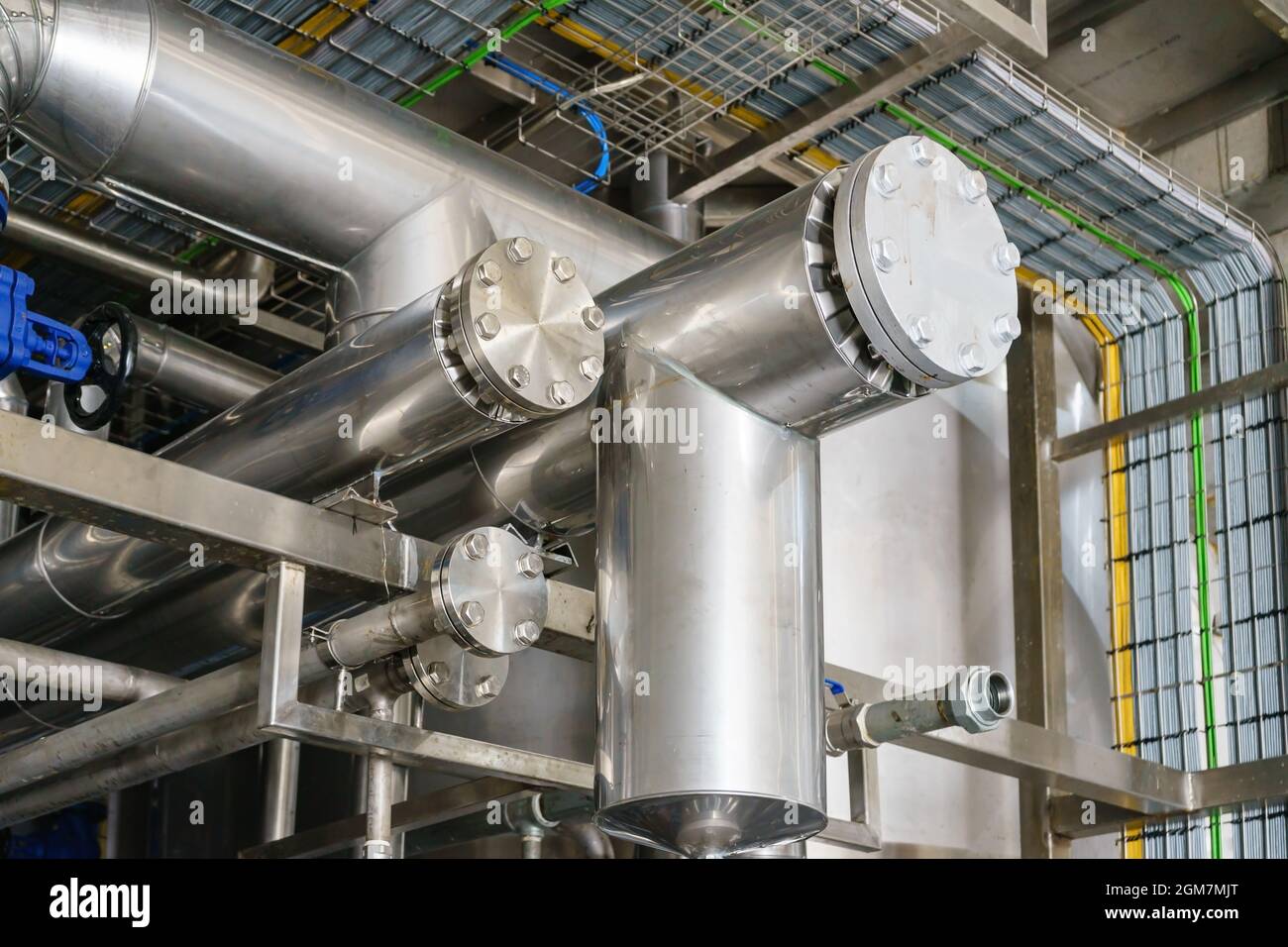 Industrial zone, Steel pipelines, valves and ladders Stock Photo - Alamy