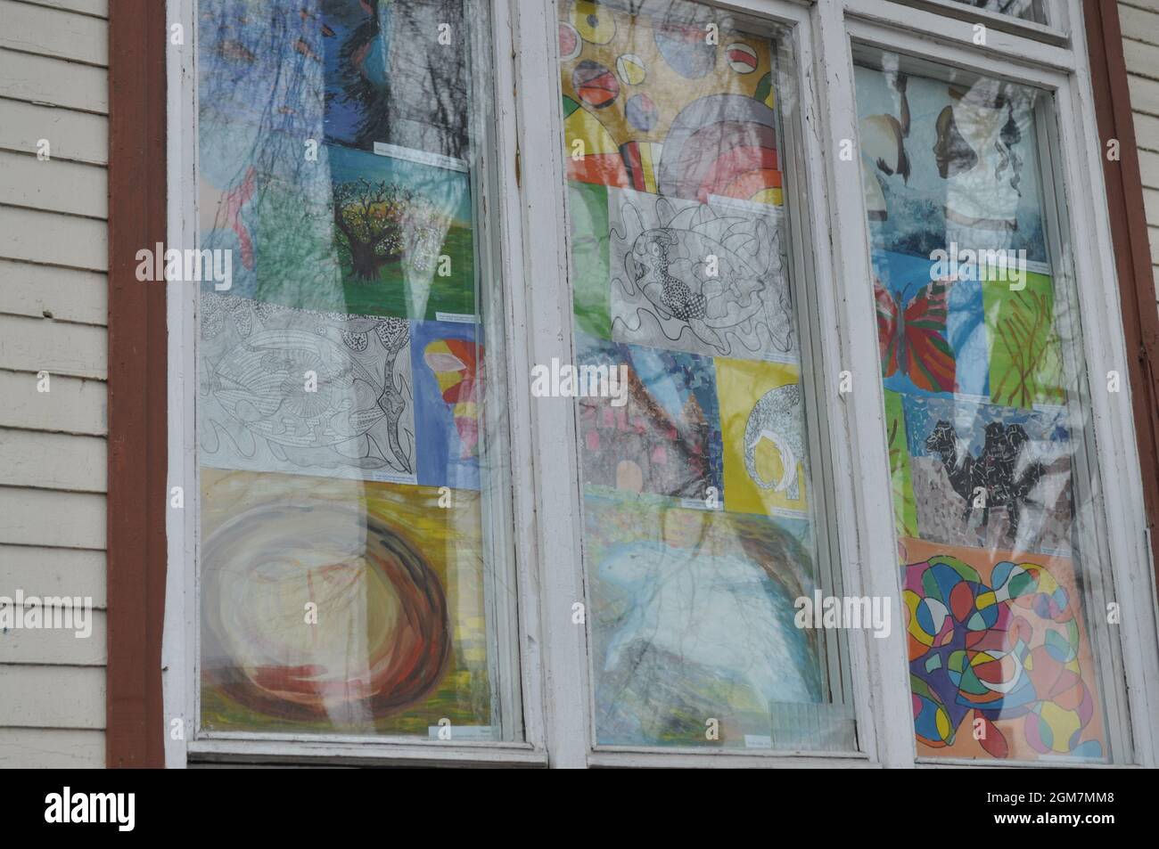 Old window in the village with children drawings paintings Stock Photo ...