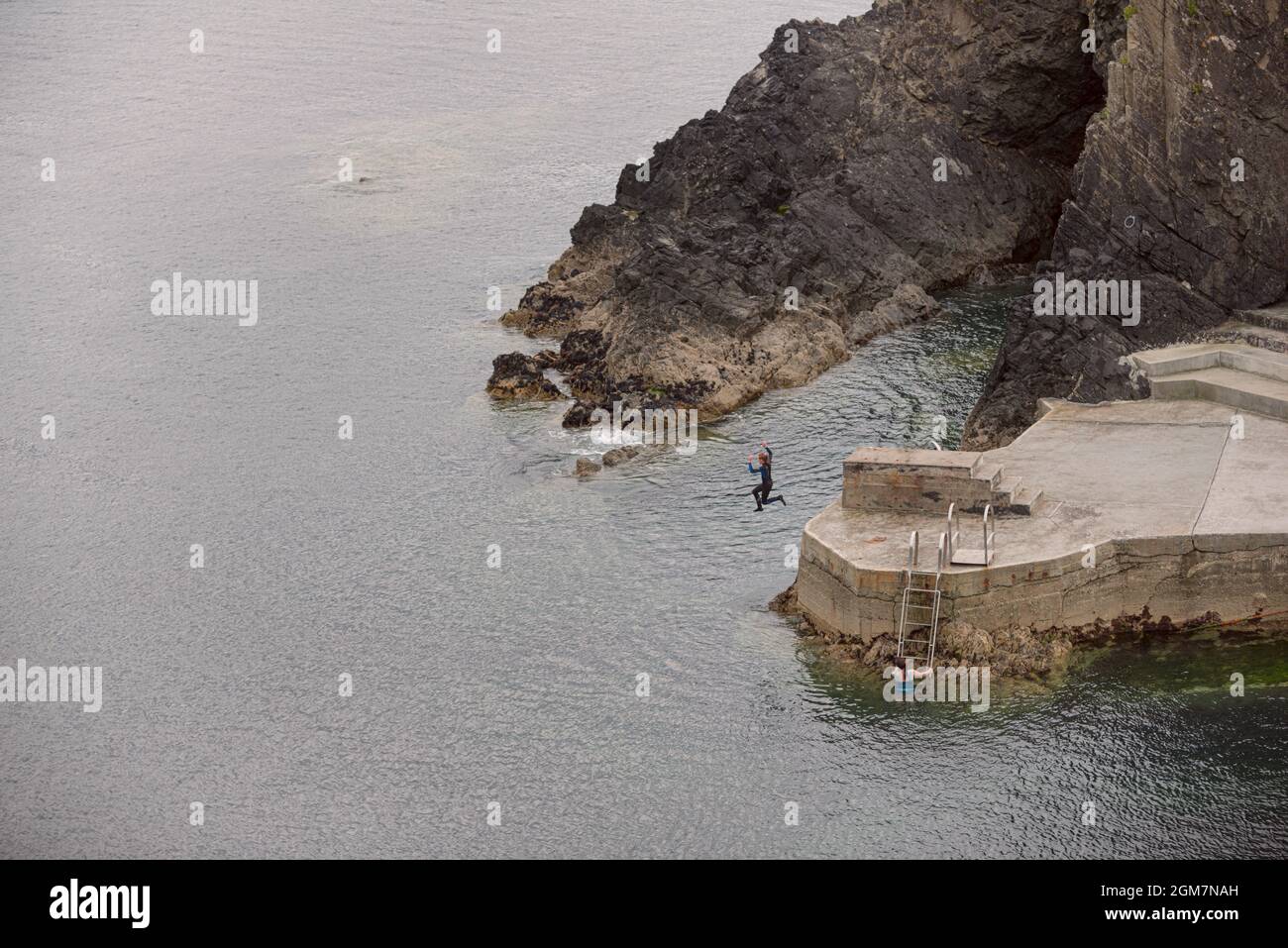 Jump off cliff into water hi-res stock photography and images - Alamy