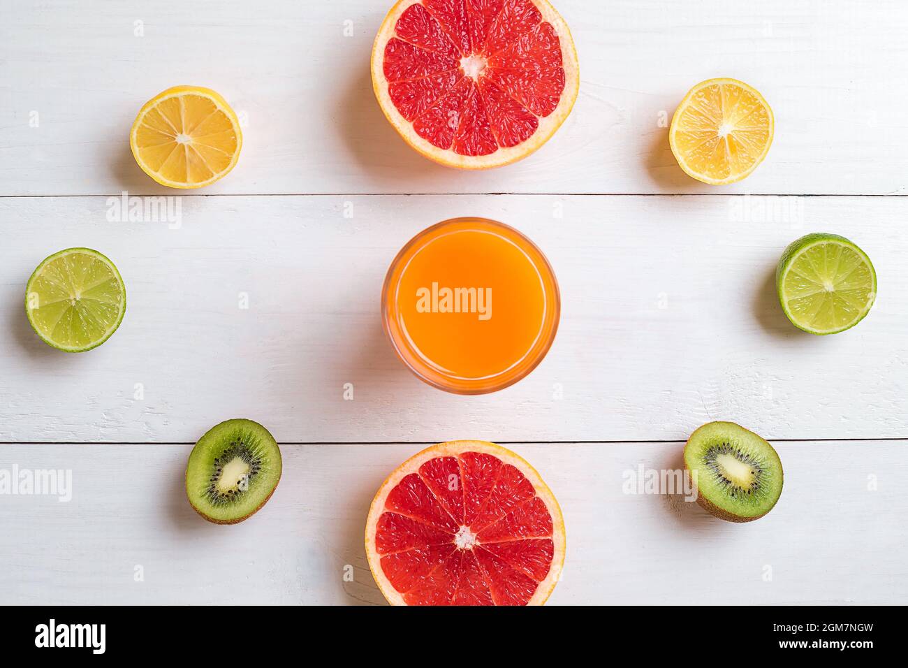 Various citrus fruits with a drink on the table. Top view Stock Photo ...