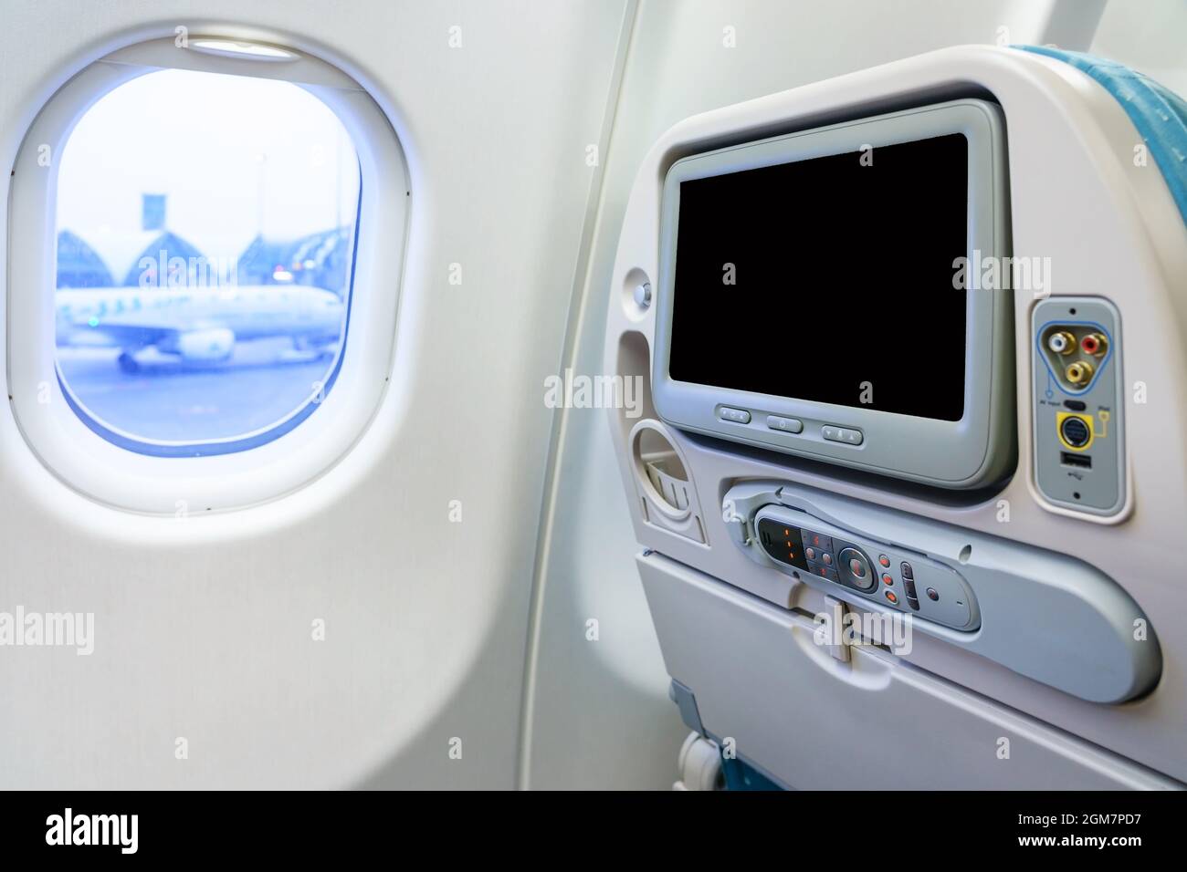 Aircraft monitor in passenger seat isolated on black background for ...