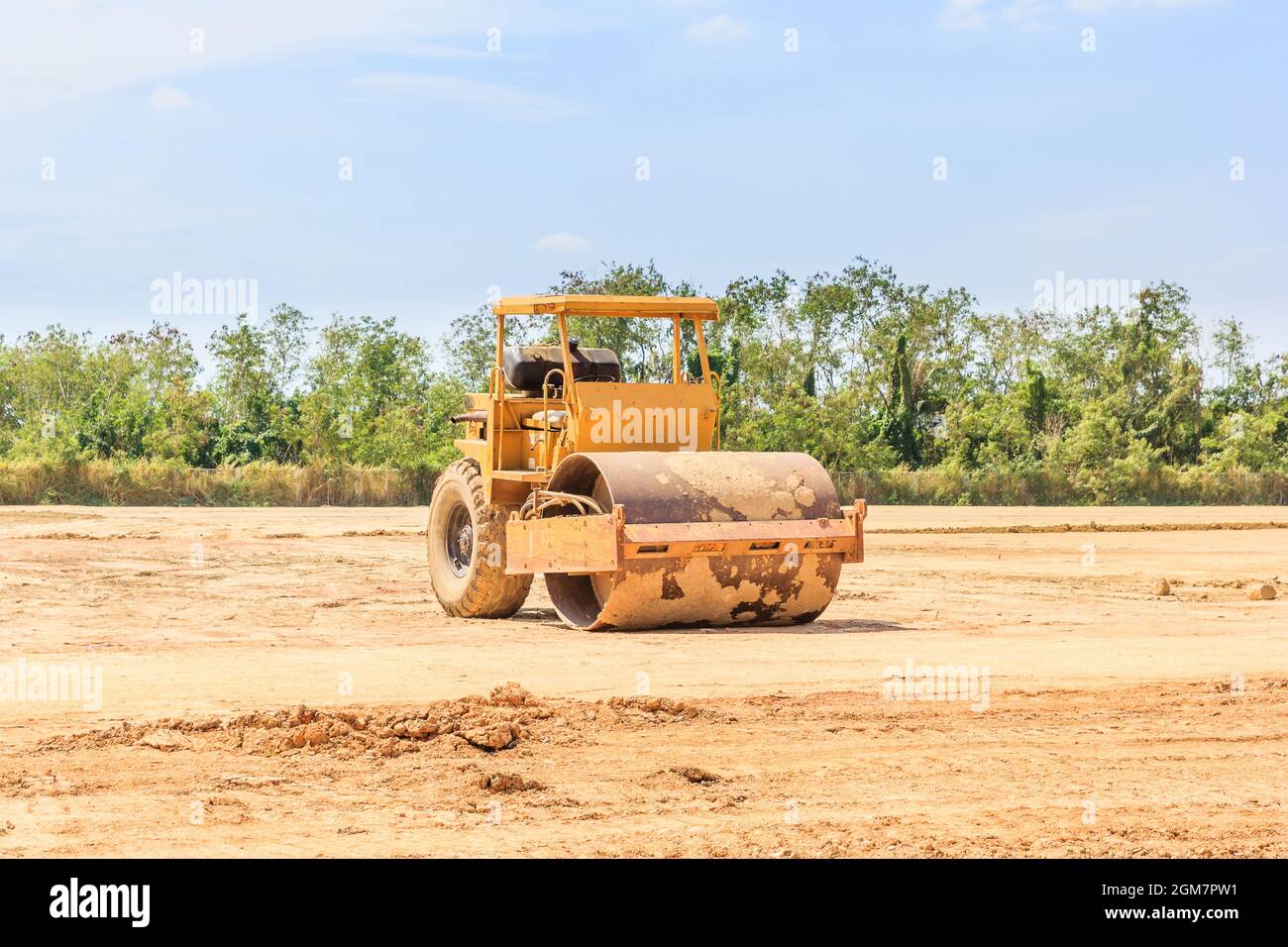 soil vibration roller during sand compacting works at construction site ...