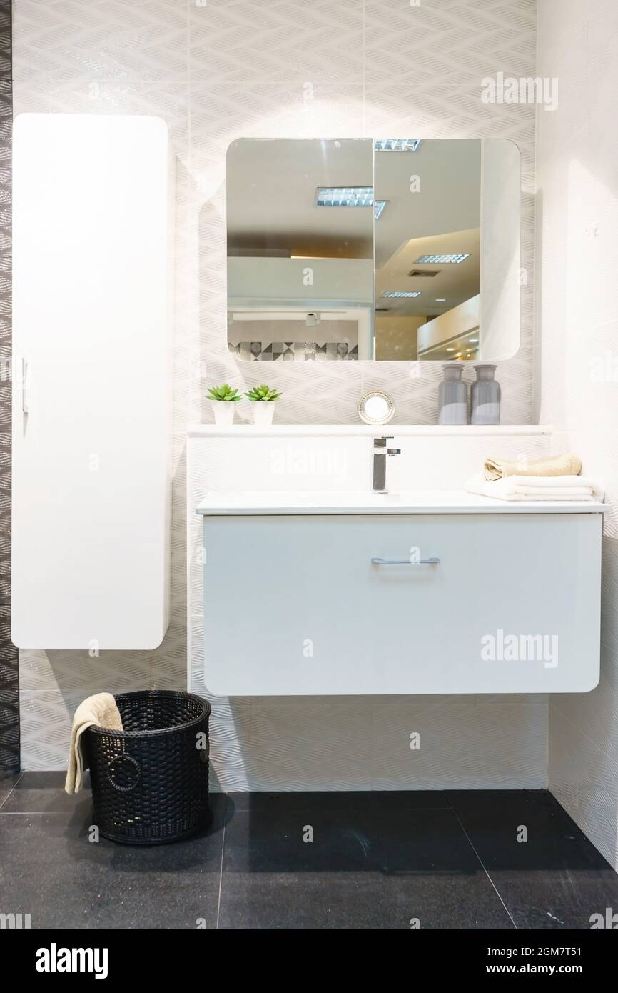 Interior of bathroom with sink basin faucet and mirror. Modern design ...