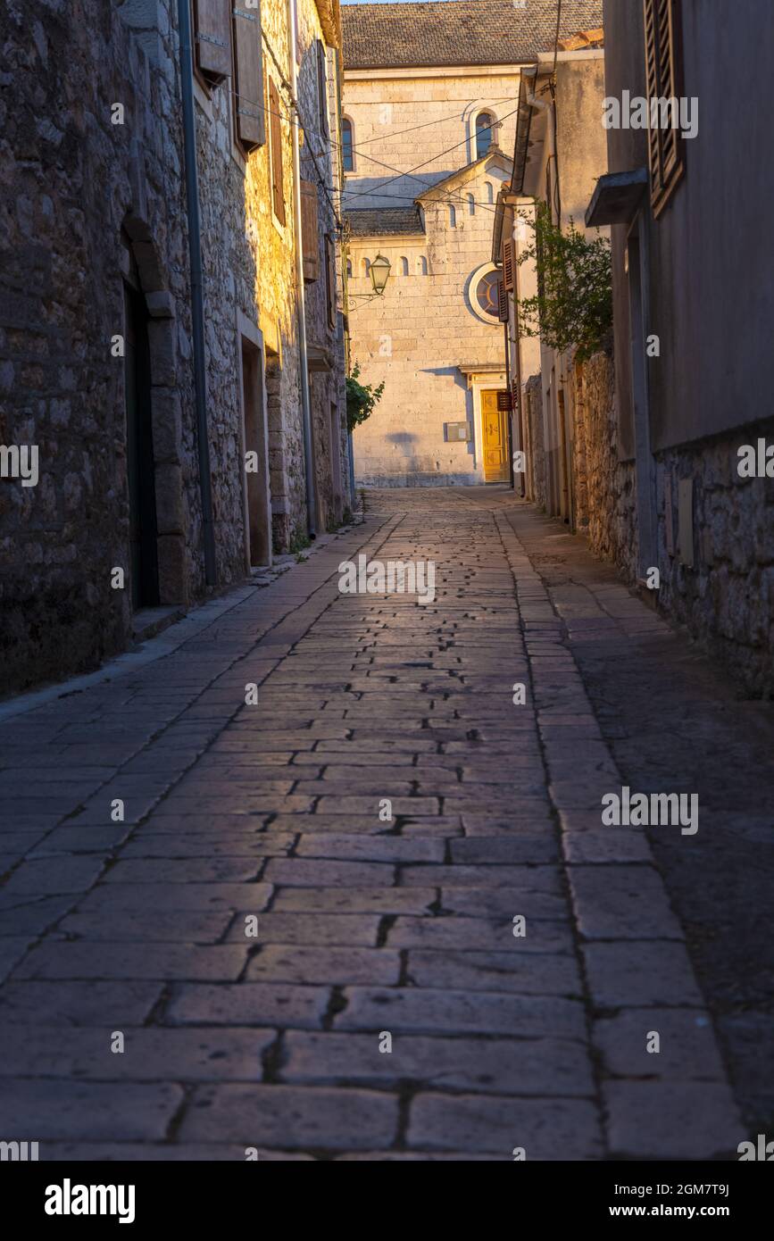 The narrow cobbled street of Stari Grad town on Hvar island, Croatia ...
