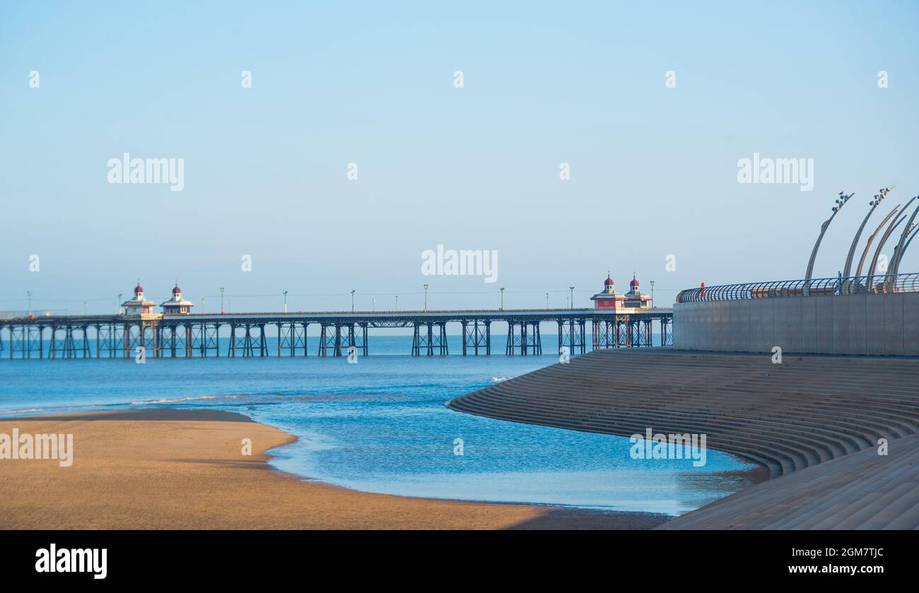 Beautiful shot of the Northsea Blackpool pier with white sands and blue ...