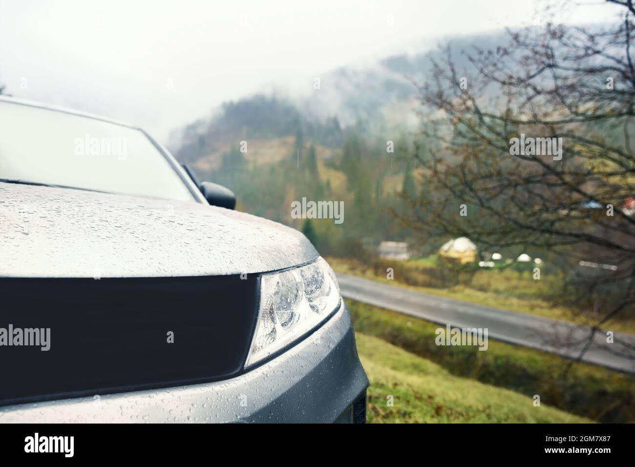 Front view of car in rainy weather Stock Photo - Alamy