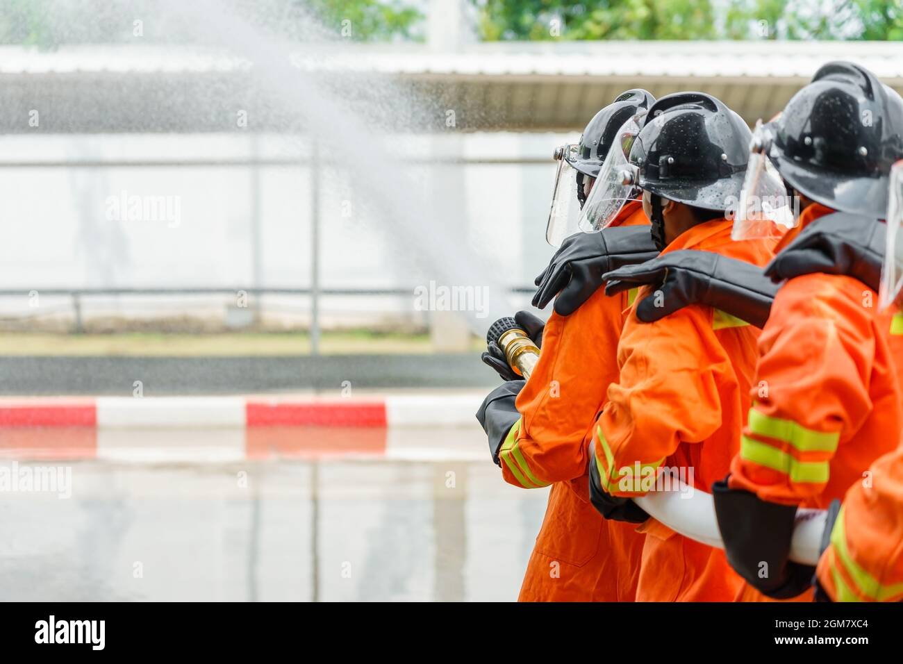 Using fire fighting hose hi-res stock photography and images - Alamy