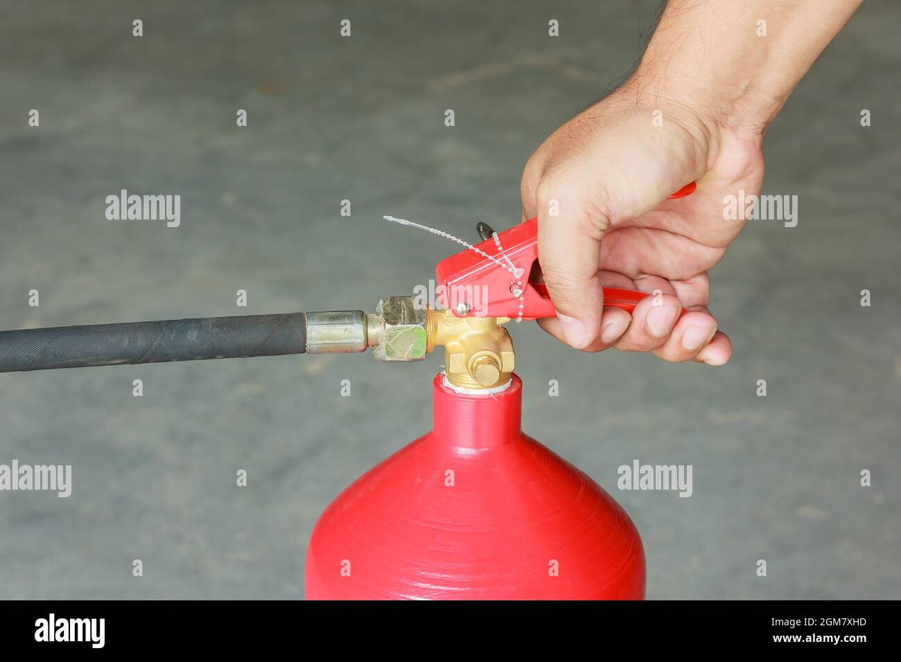 Male hands presses the trigger fire extinguisher, Closeup Stock Photo ...