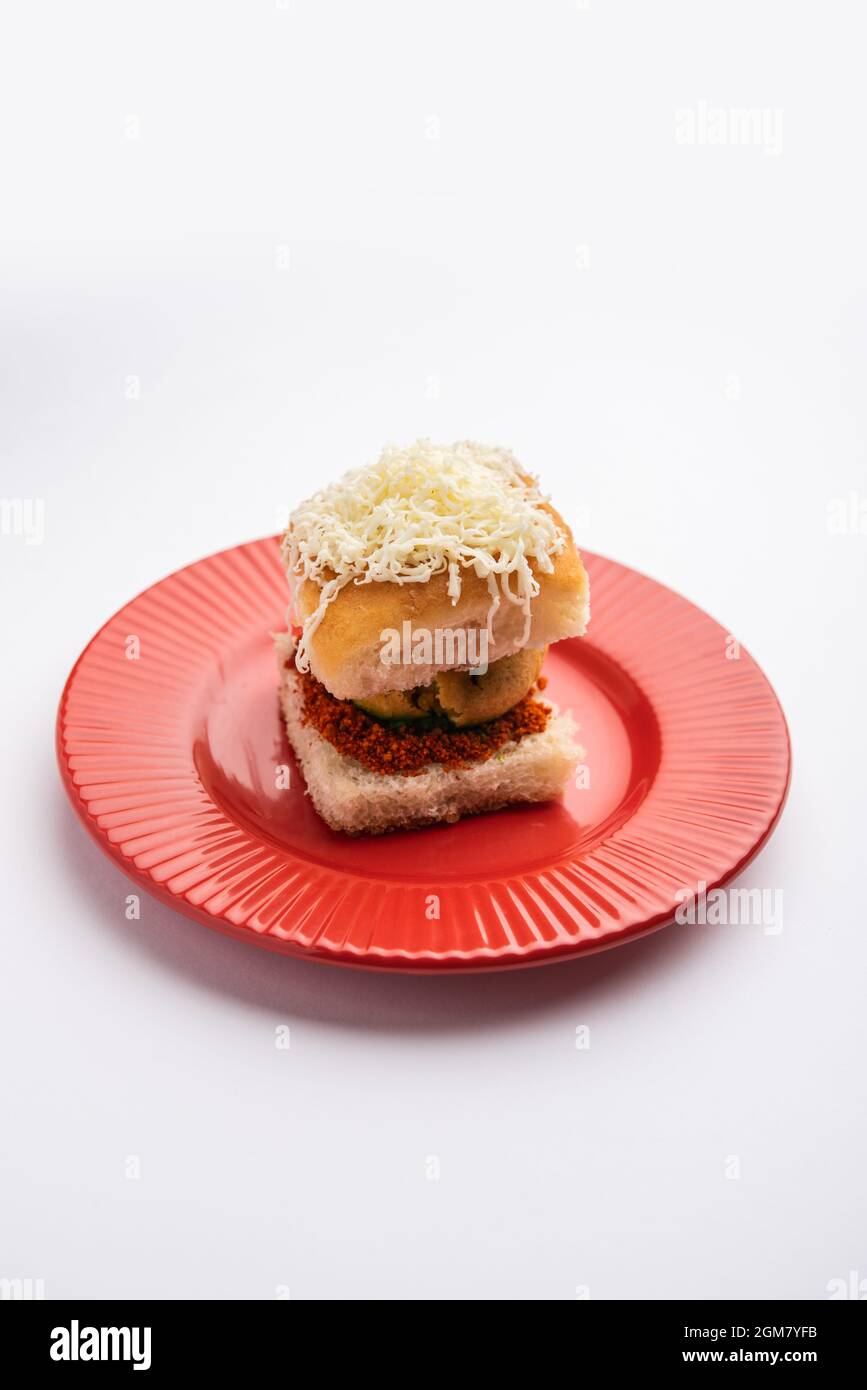 Cheese Vada pav or Grated cheese Wada Pao, popular Bombay snack food ...