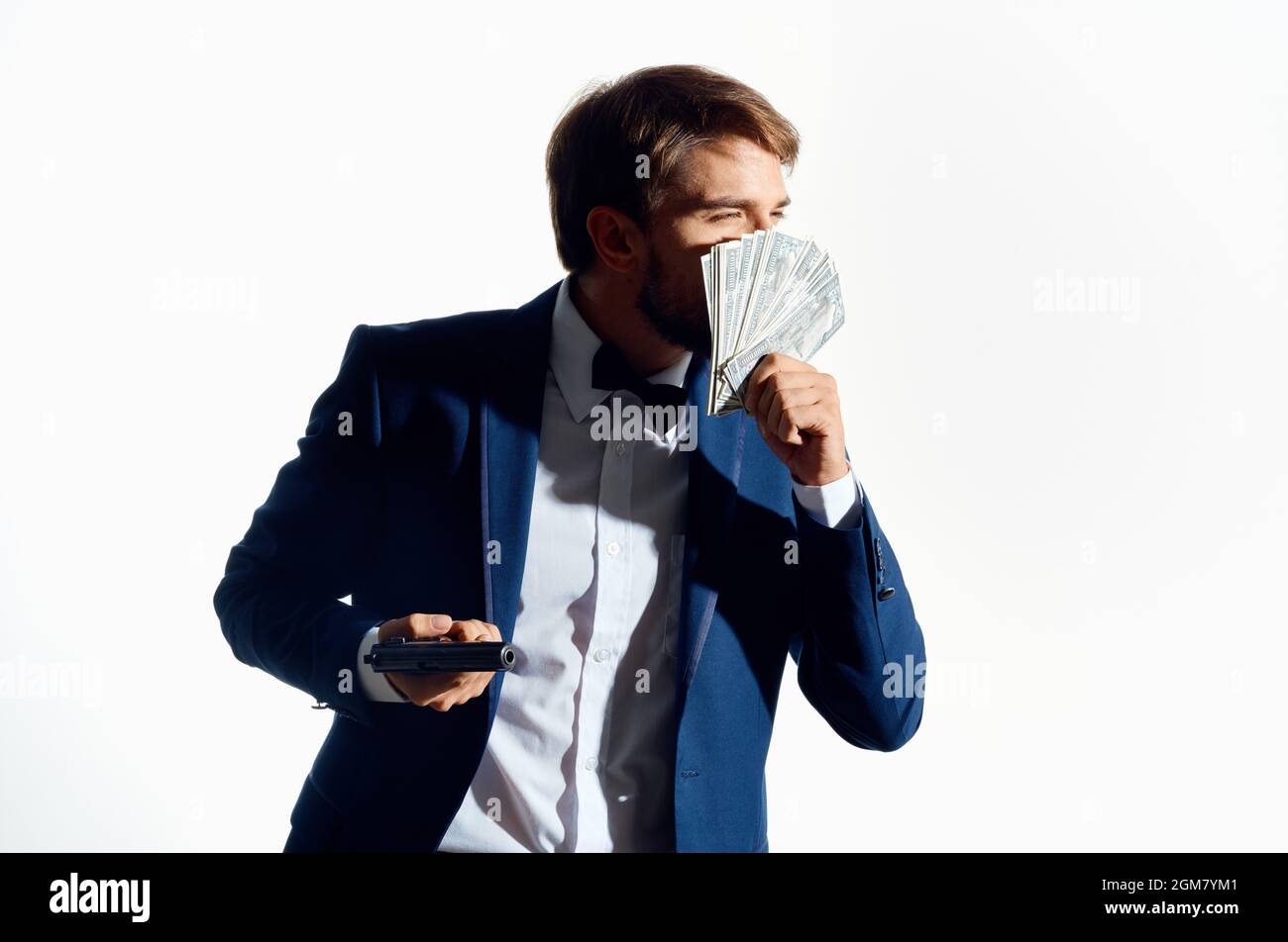 man in a suit finance success light background Stock Photo - Alamy