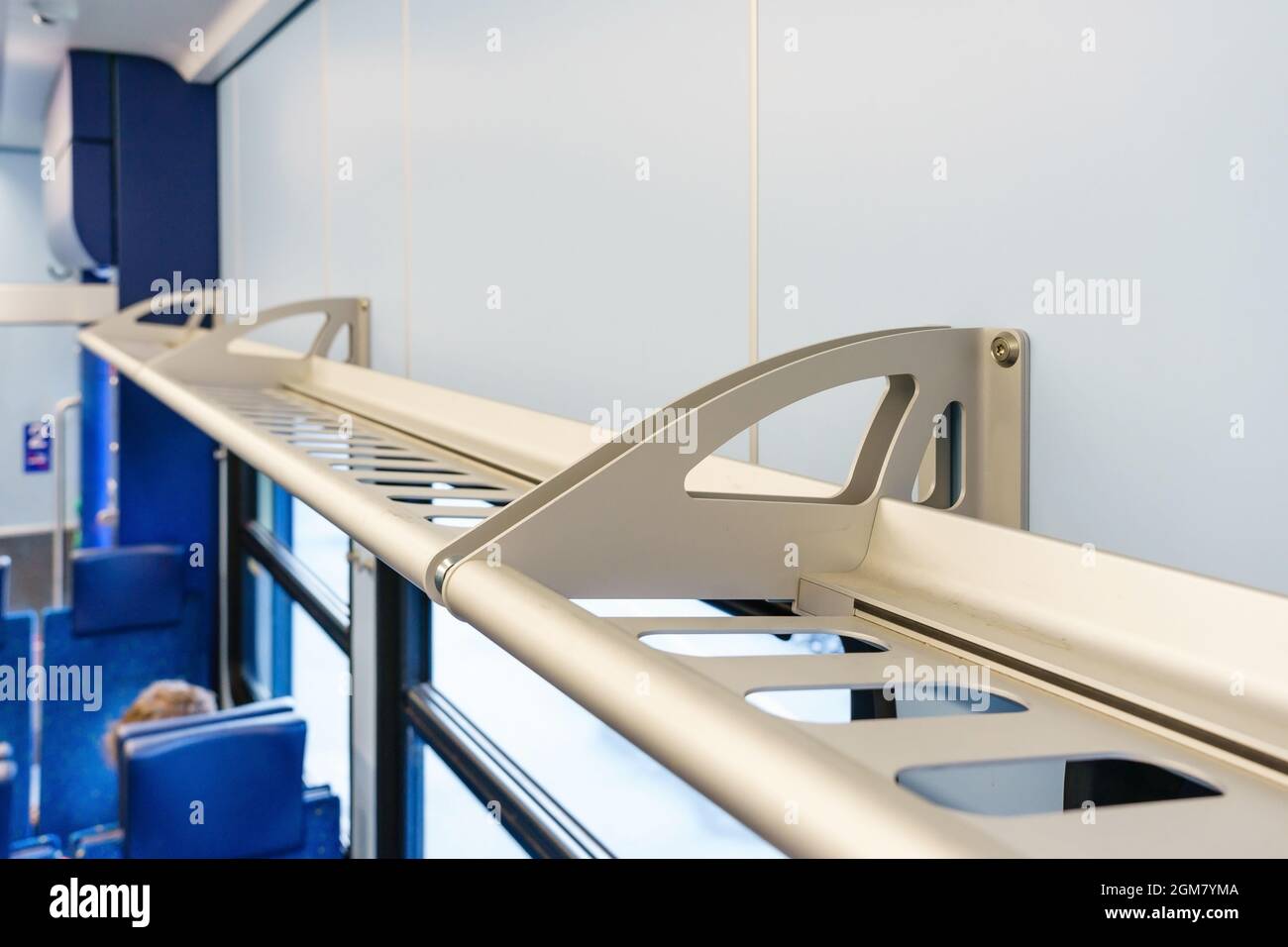 overhead storage area on passenger train Stock Photo - Alamy