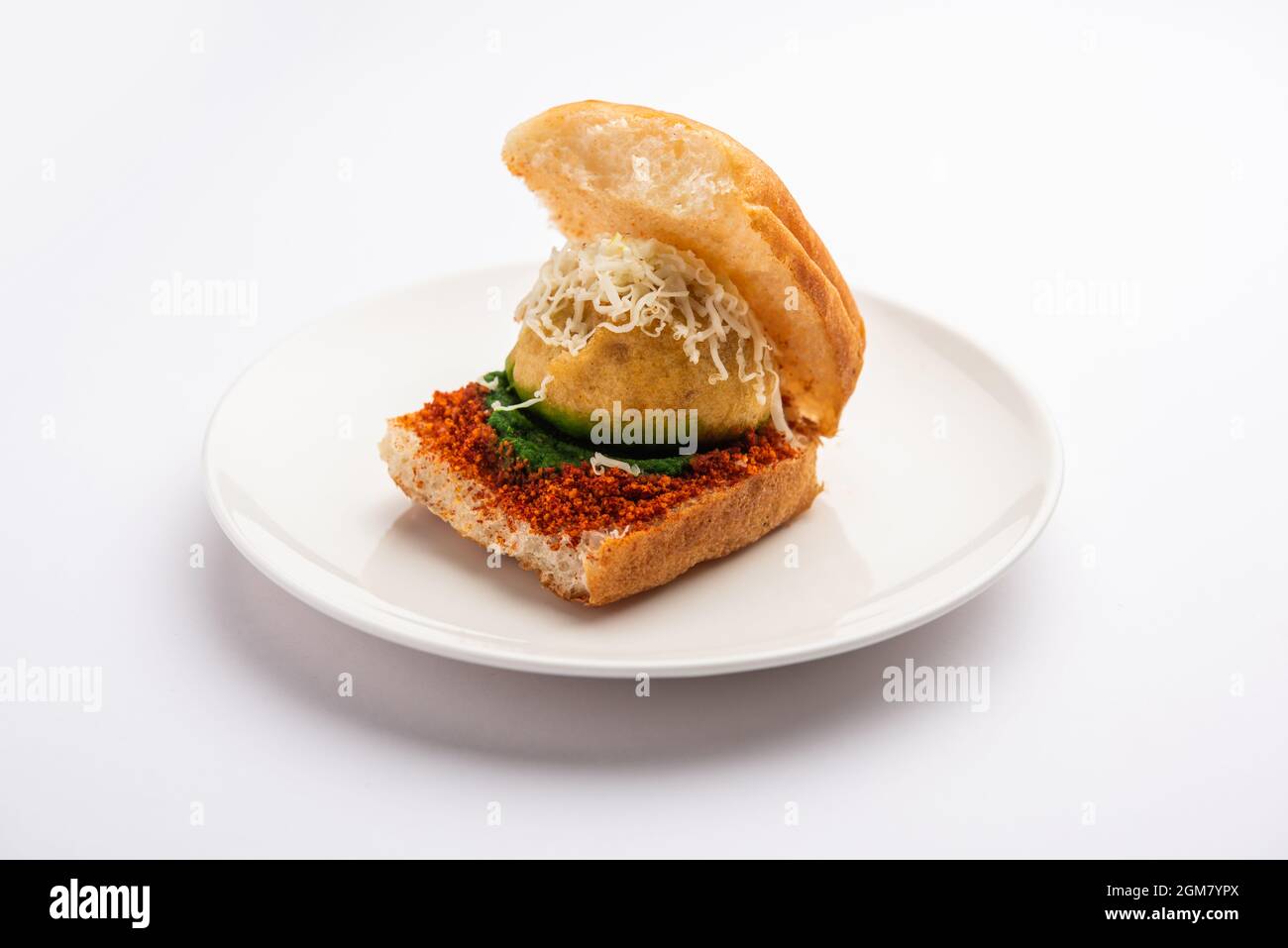 Cheese Vada pav or Grated cheese Wada Pao, popular Bombay snack food ...