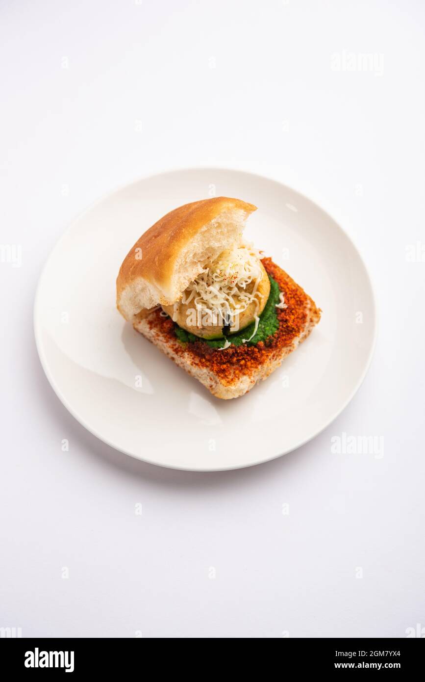 Cheese Vada pav or Grated cheese Wada Pao, popular Bombay snack food ...