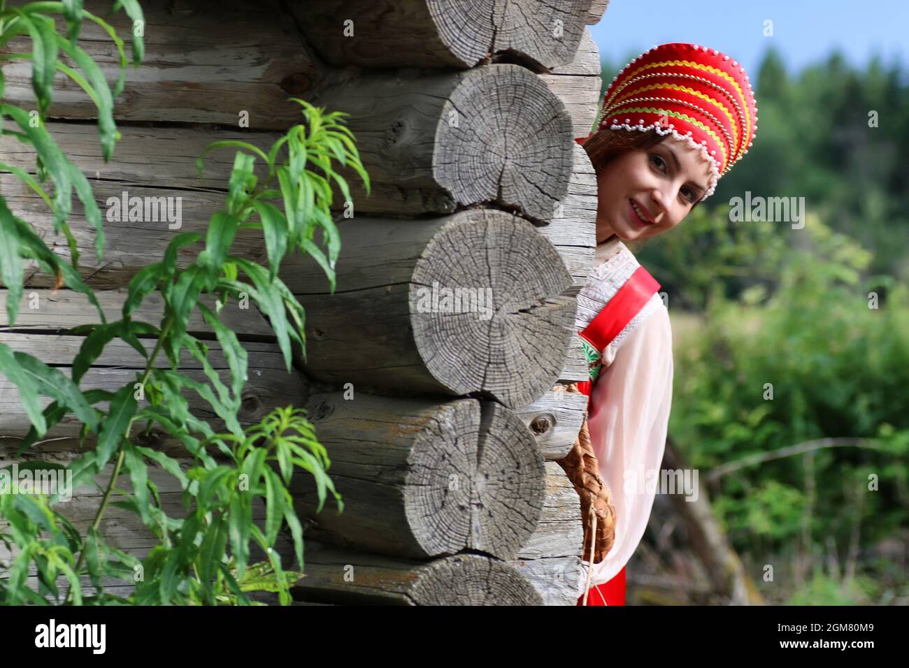 girl traditional dress log Stock Photo - Alamy