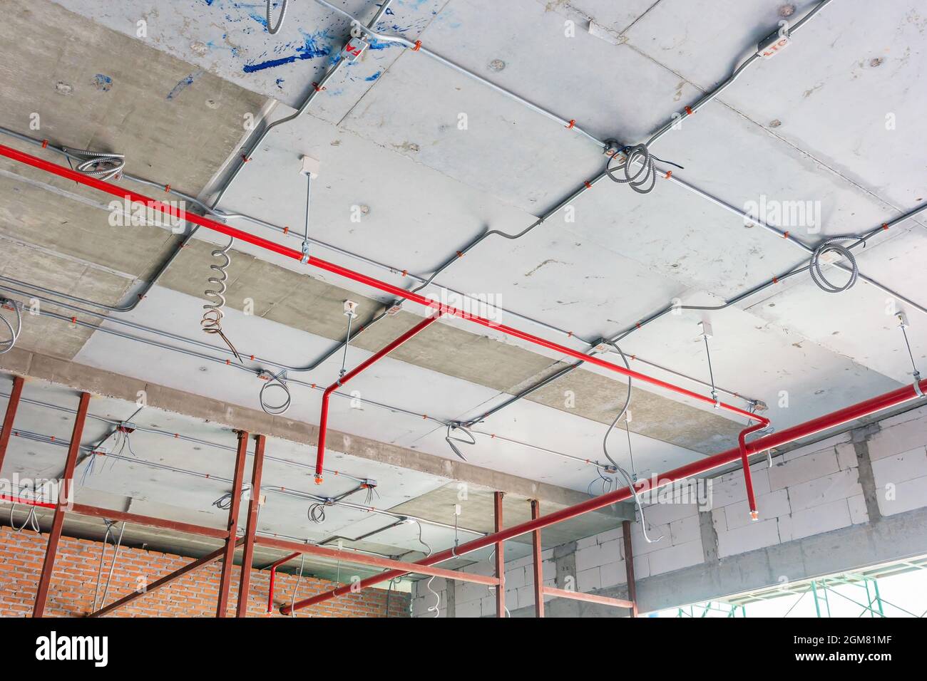 Ventilation pipes in silver insulation material and fire sprinkler on ...