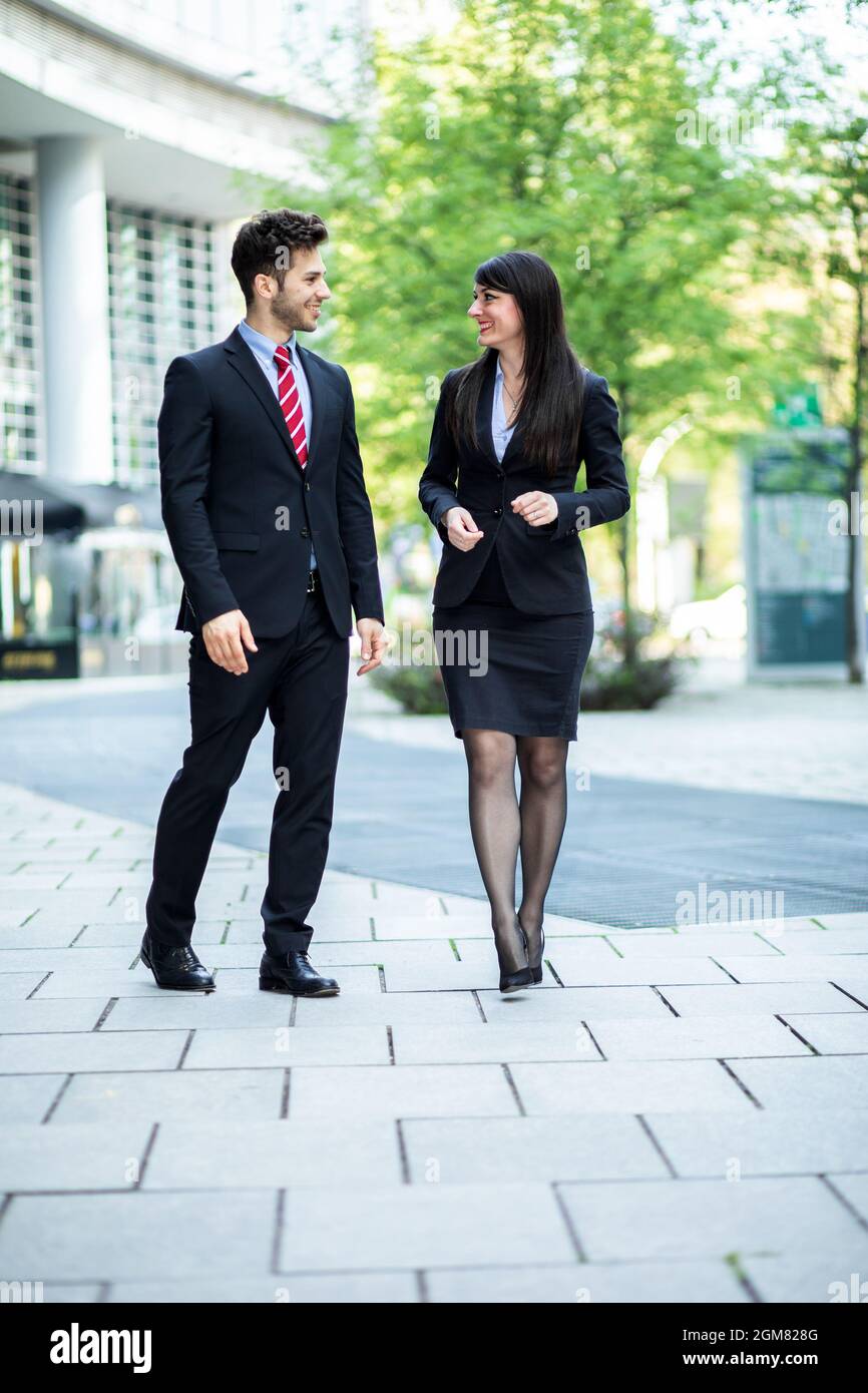 Business partners walking hi-res stock photography and images - Alamy